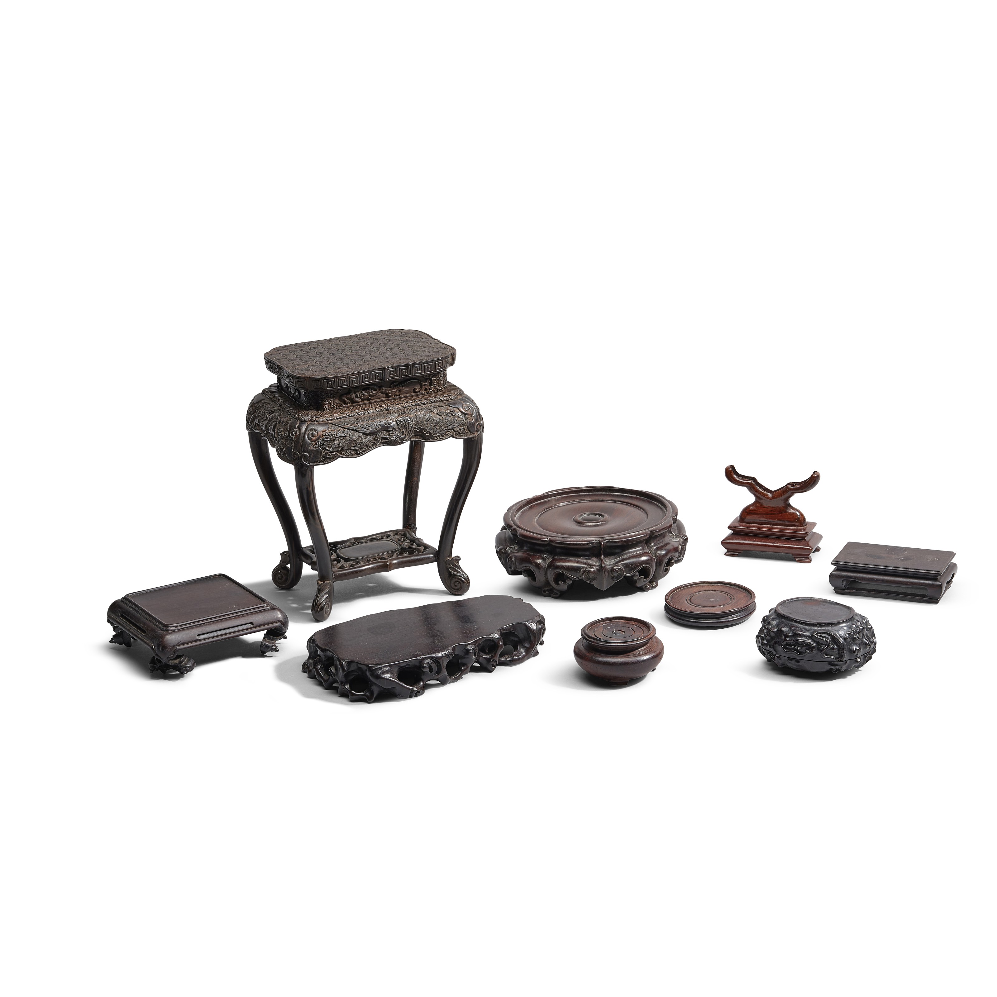 A GROUP OF EIGHT WOOD STANDS AND A SMALL ZITAN INKSTONE BOX AND COVER ...