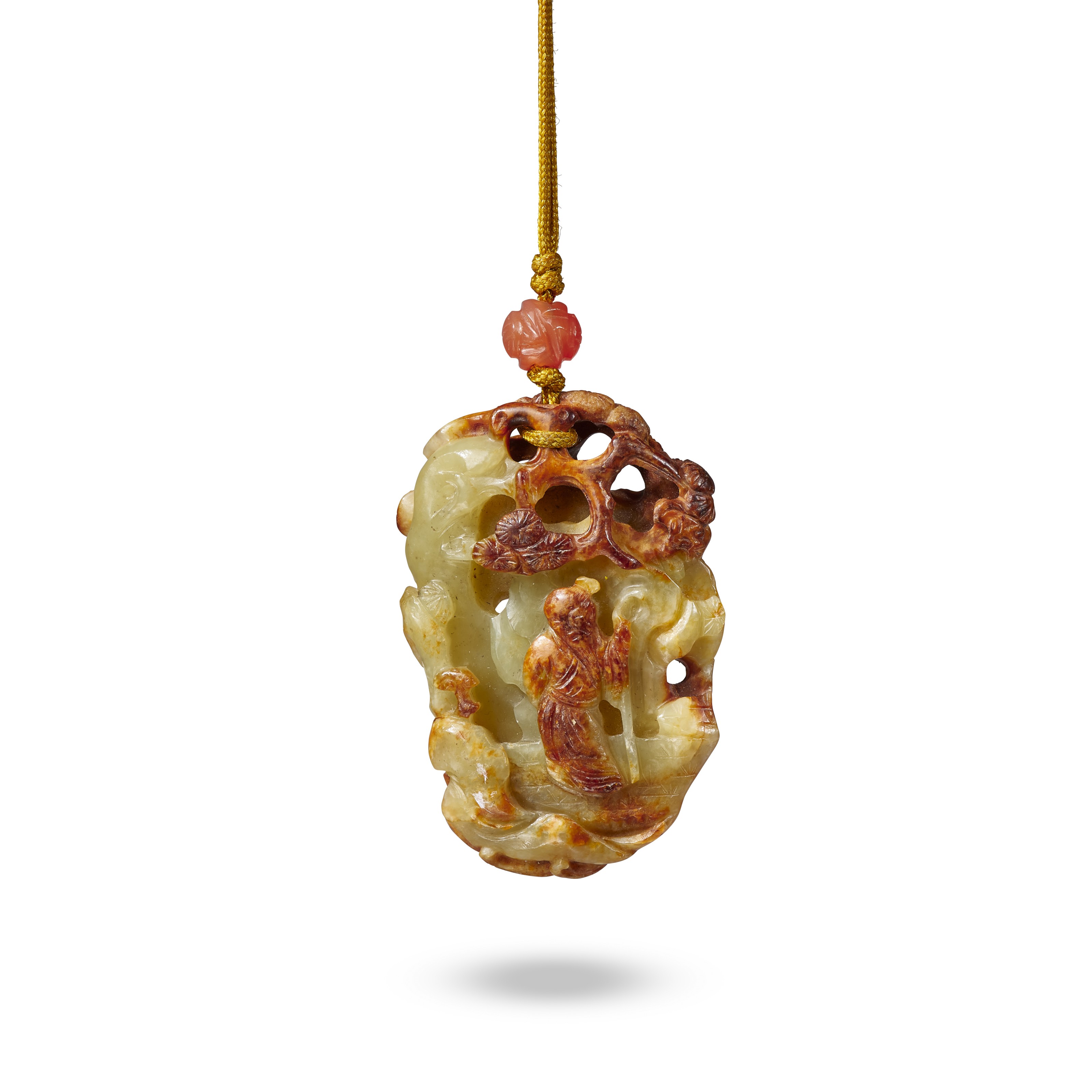 A YELLOW AND RUSSET JADE 'IMMORTAL AND DEER' PENDANT, MING DYNASTY ...