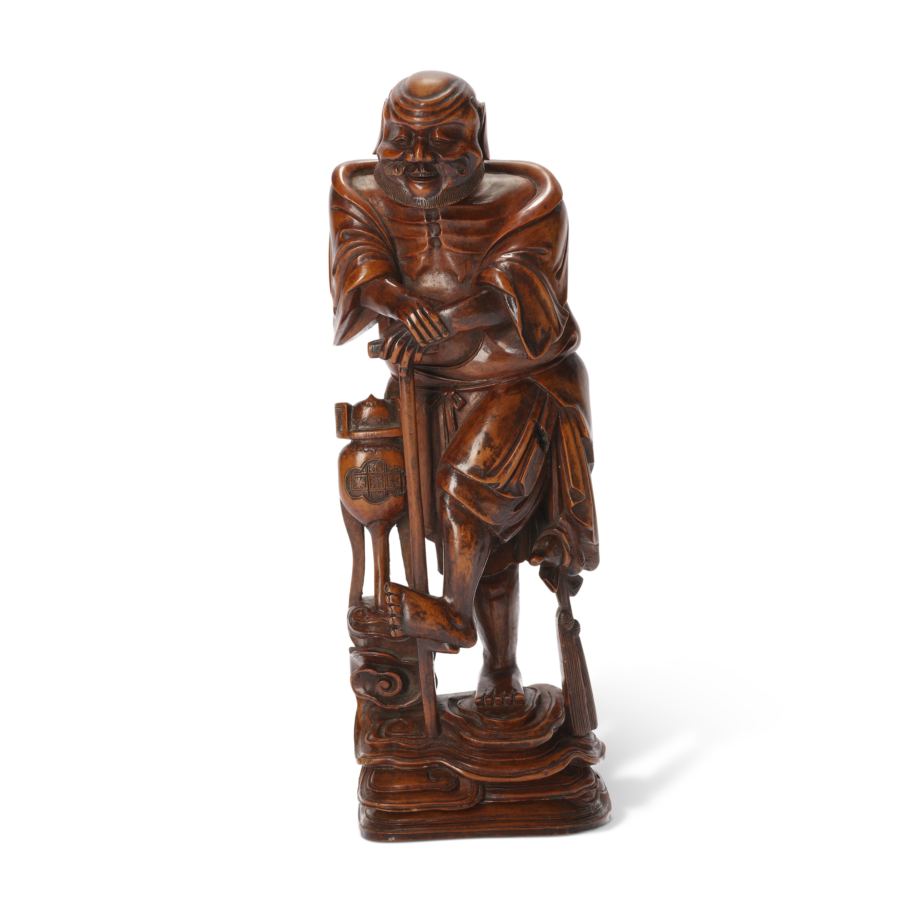 A CARVED WOOD FIGURE OF LI TIEGUAI, QING DYNASTY, 19TH CENTURY | Christie’s