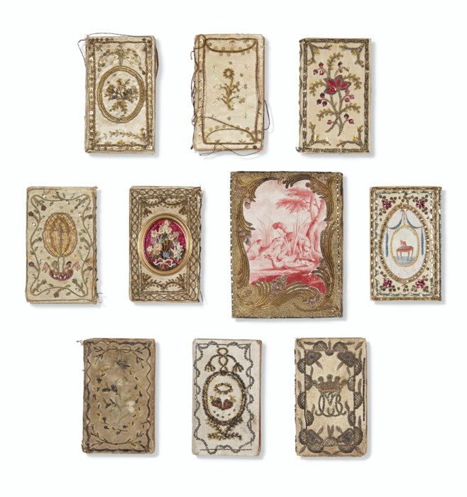 MINIATURE BOOKS – 10 miniature books bound in white silk with ...