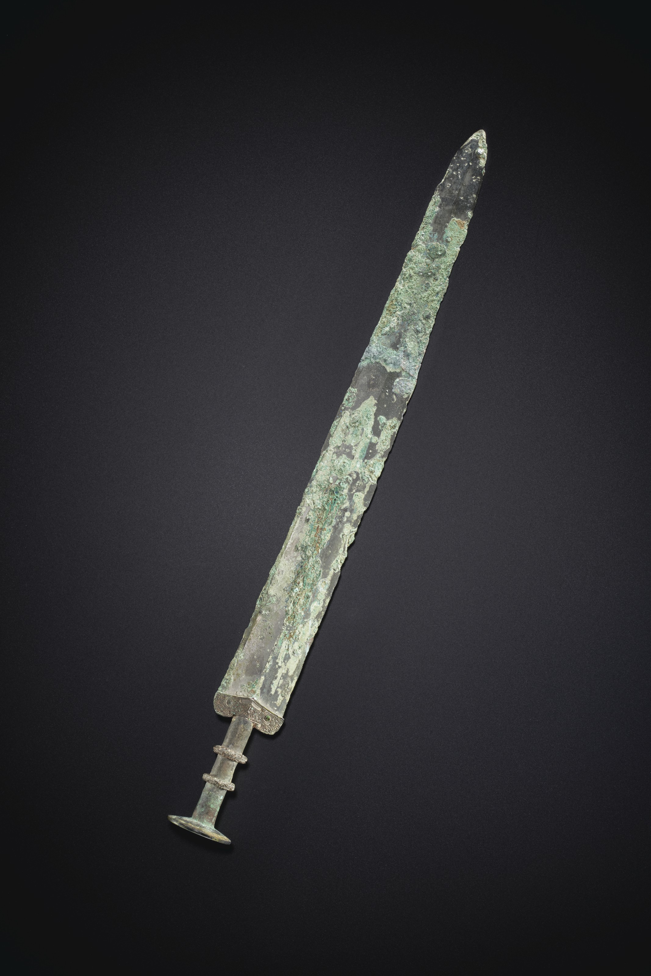 A FINELY CAST BRONZE SWORD