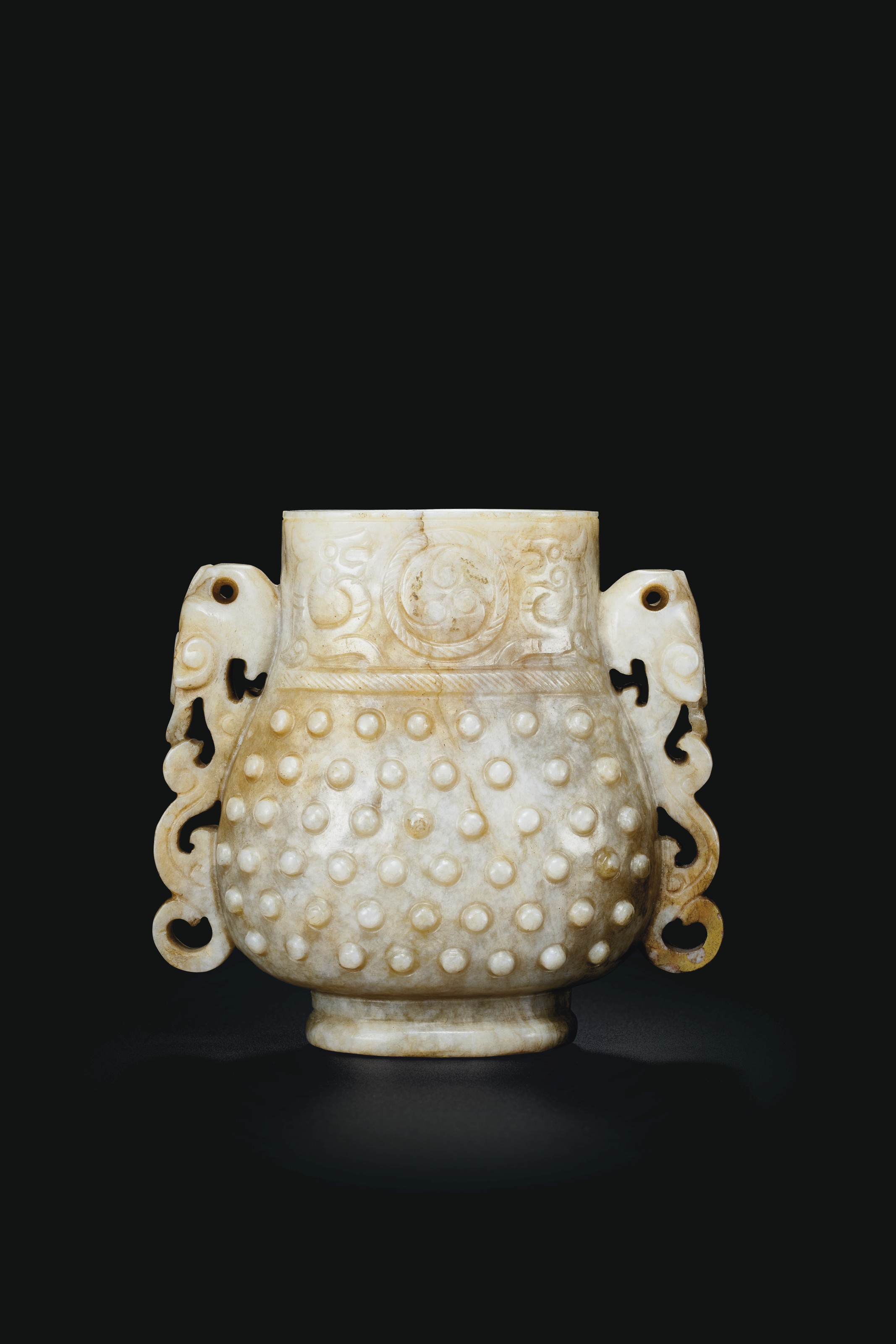 A BEIGE AND PALE RUSSET JADE OVAL CUP WITH HANDLE, MING DYNASTY (1368 ...