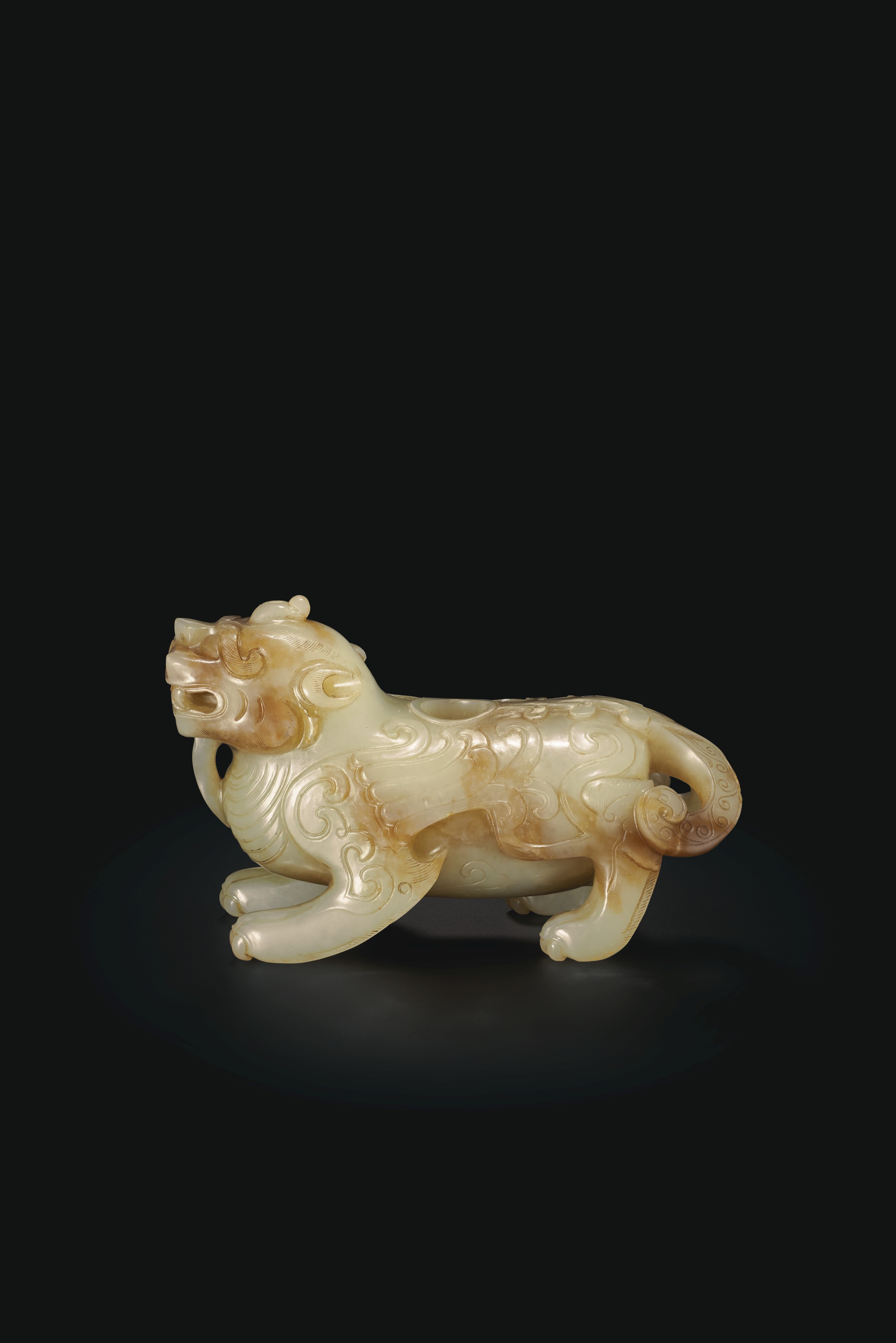 A BEIGE AND PALE RUSSET JADE OVAL CUP WITH HANDLE, MING DYNASTY (1368 ...