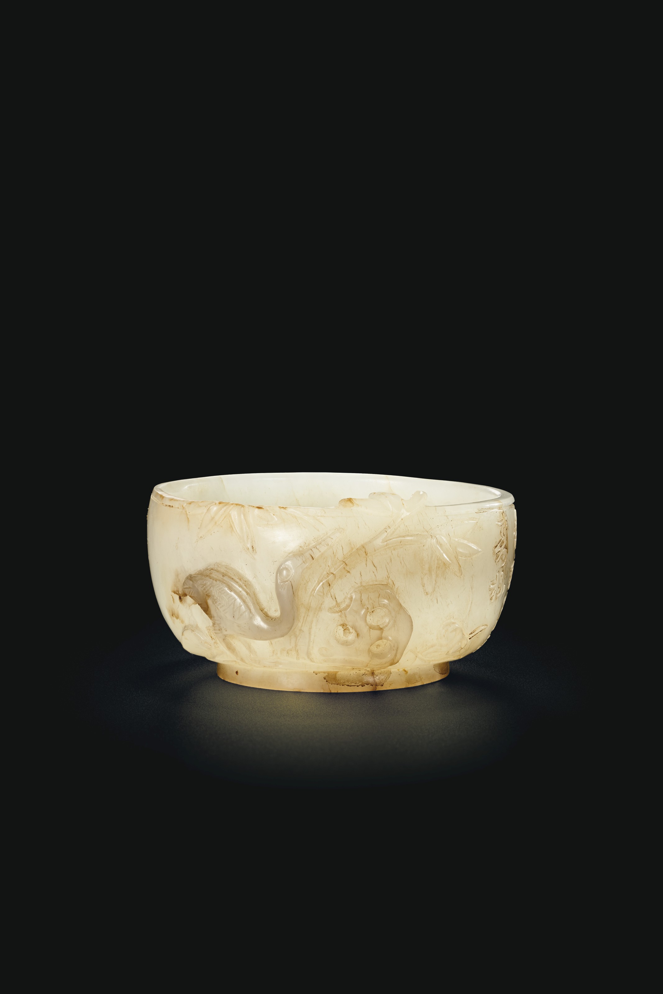 A BEIGE AND PALE RUSSET JADE OVAL CUP WITH HANDLE, MING DYNASTY (1368 ...