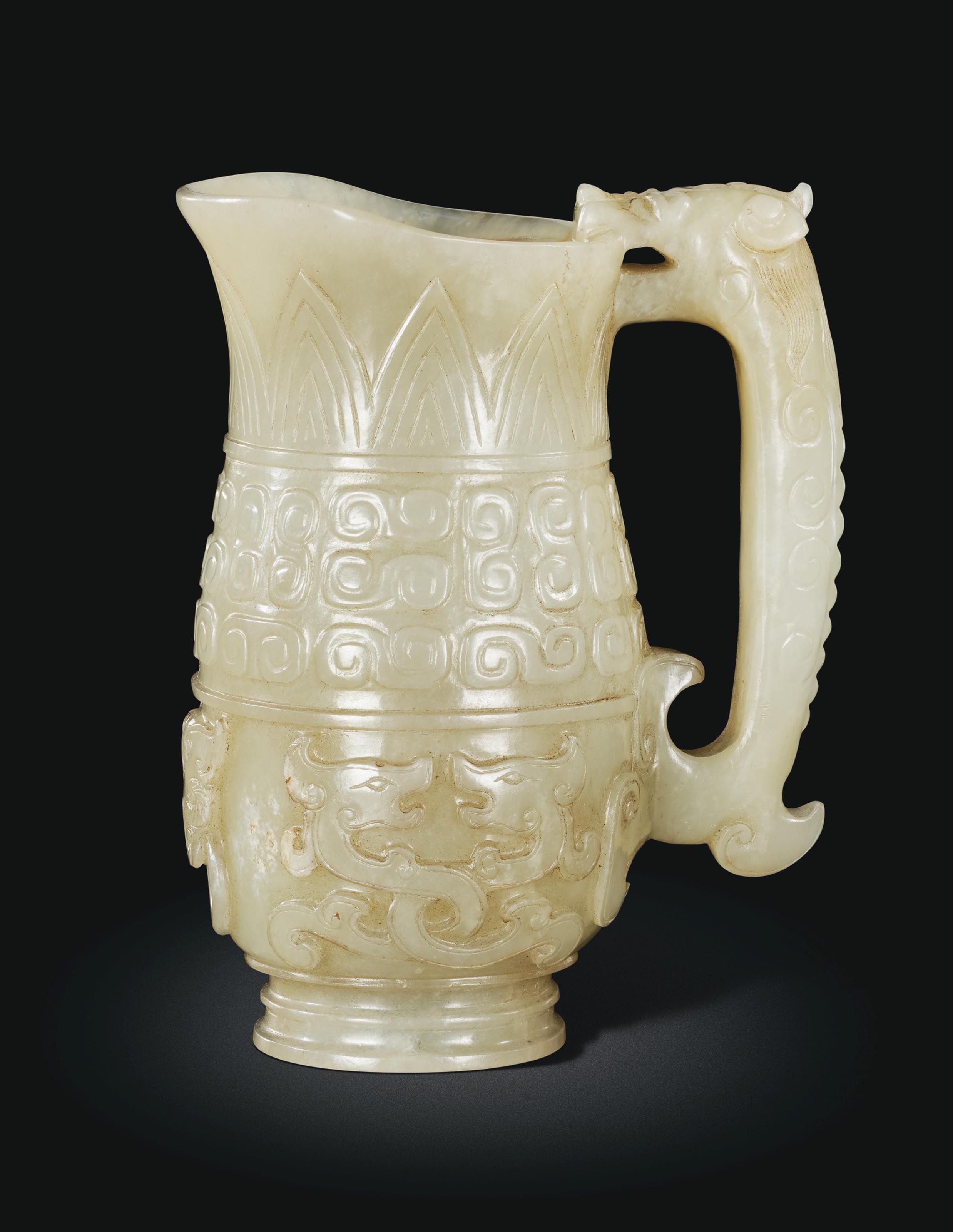 A PALE GREYISH-WHITE JADE CHIMERA-FORM WATER POT, MING DYNASTY (1368 ...