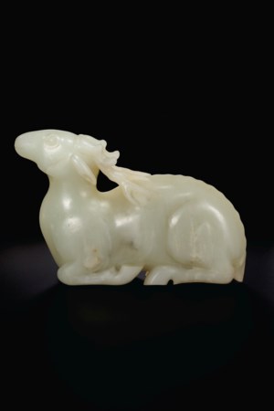 A LARGE WHITE JADE FIGURE OF A RECUMBENT STAG, 17TH-18TH CENTURY ...
