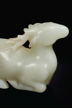 A LARGE WHITE JADE FIGURE OF A RECUMBENT STAG, 17TH-18TH CENTURY ...