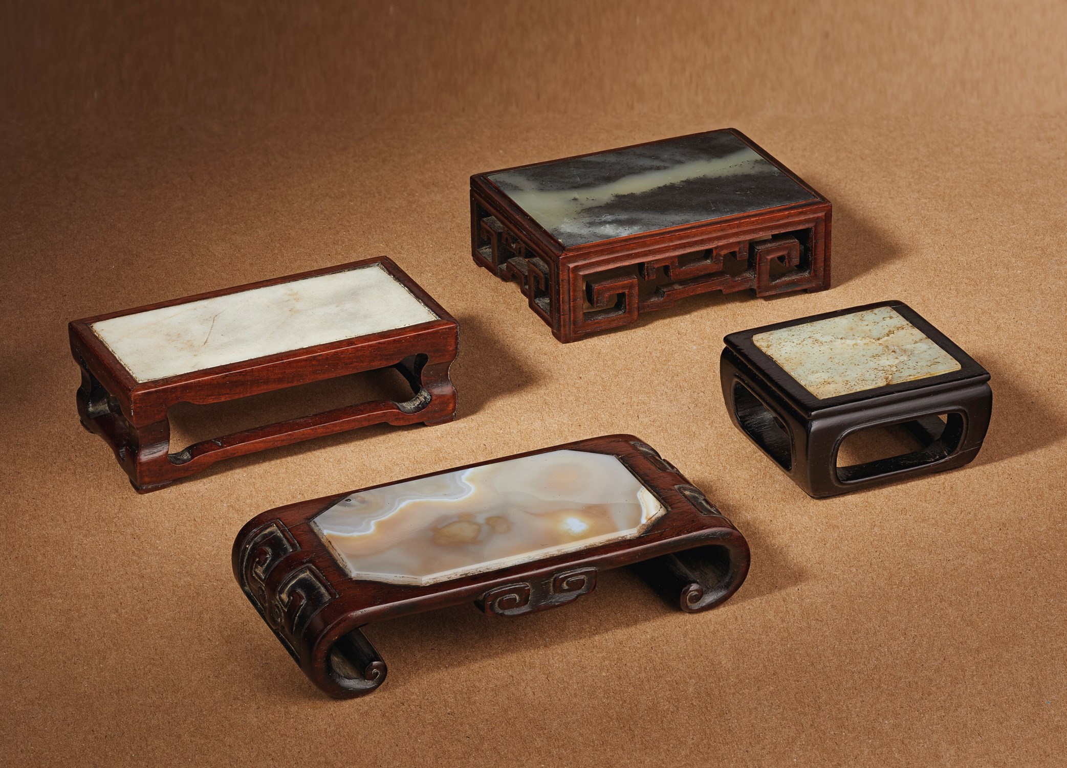 FOUR STONE-INSET WOOD STANDS, 18TH-19TH CENTURY | Christie's