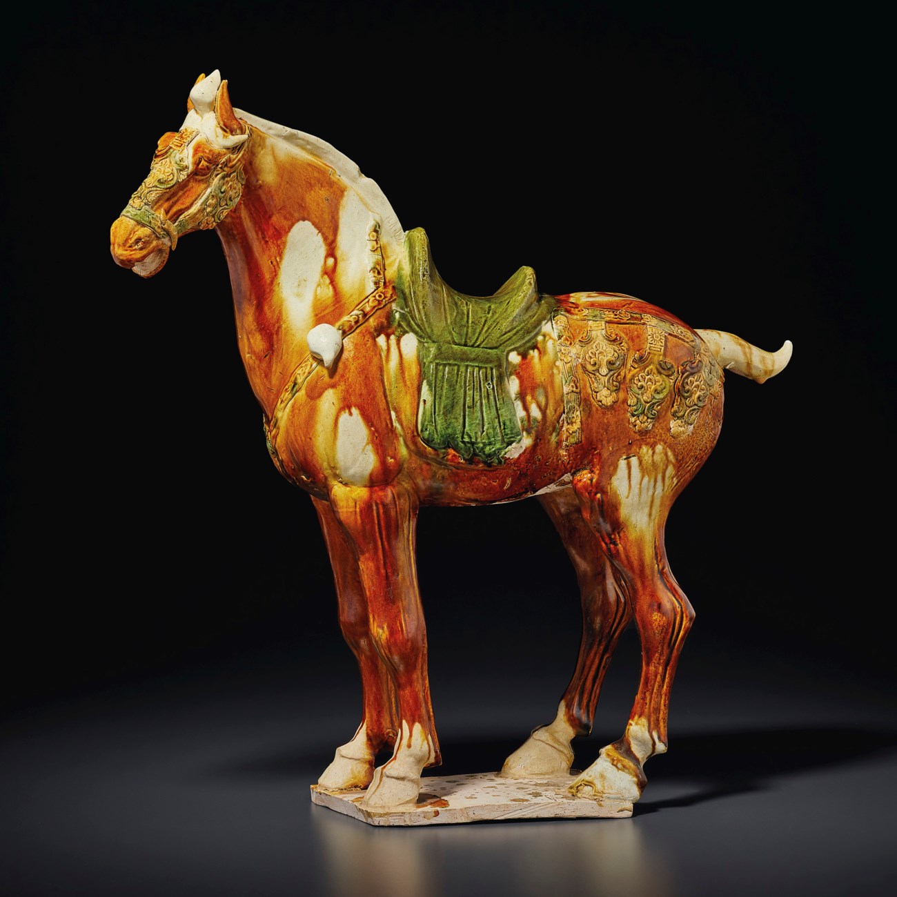 A LARGE SANCAI-GLAZED POTTERY HORSE, TANG DYNASTY (AD 618-907) | Christie's