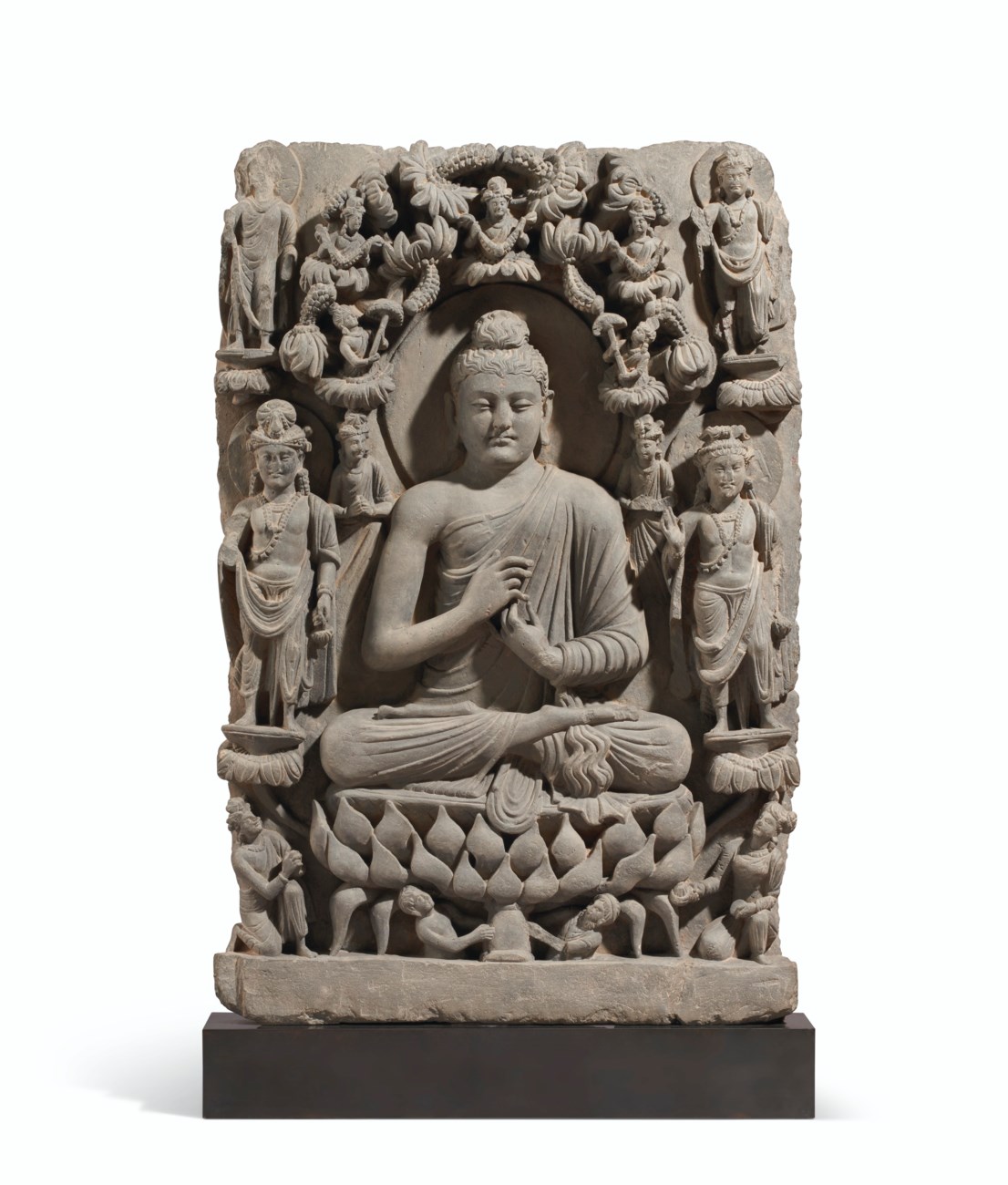 A RARE GRAY SCHIST RELIEF TRIAD OF BUDDHA SHAKYAMUNI FLANKED BY BODHISATTVAS, ANCIENT REGION OF ...