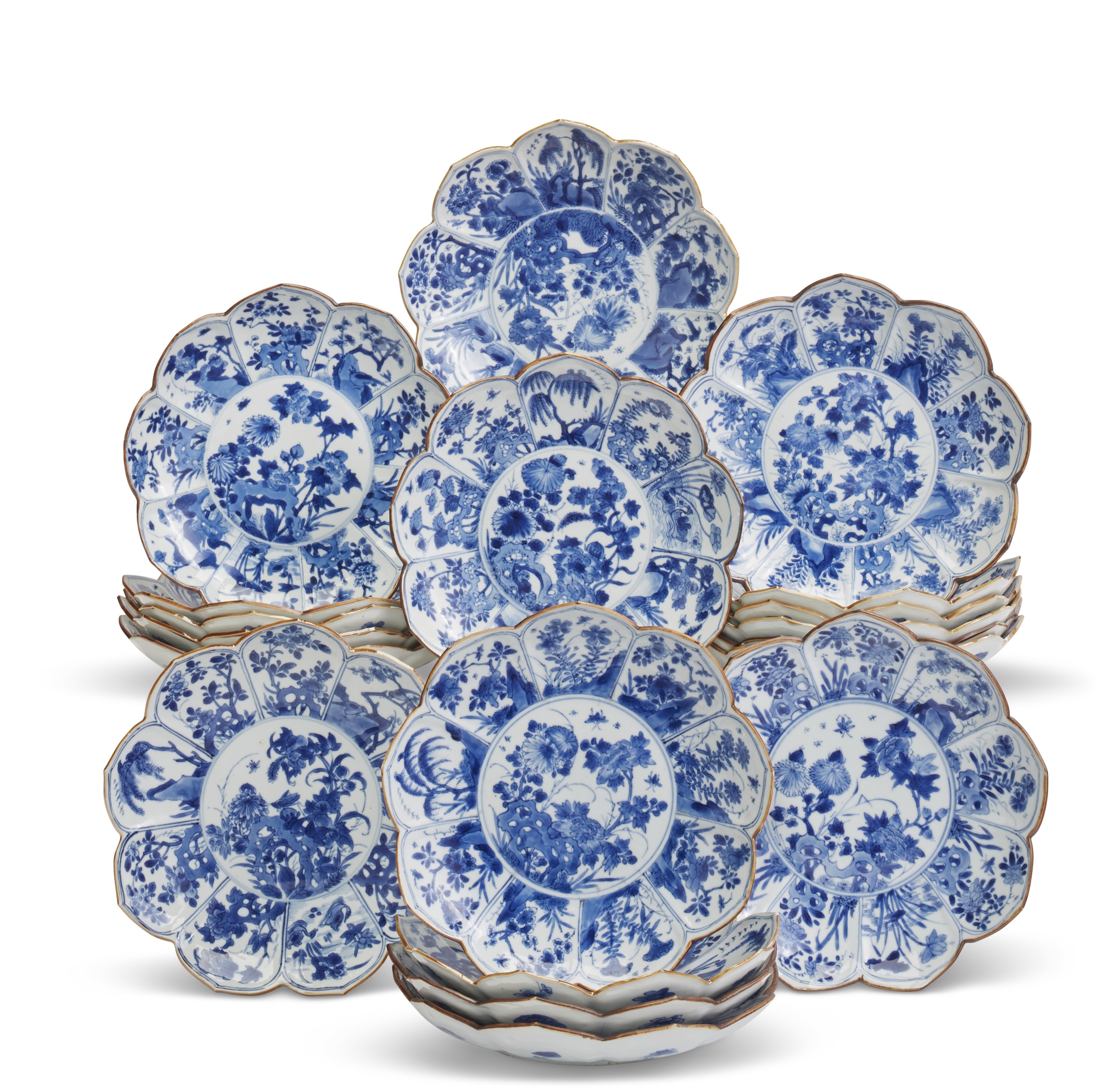 A SET OF NINETEEN CHINESE MOLDED BLUE AND WHITE 'LOTUS' DISHES, KANGXI ...