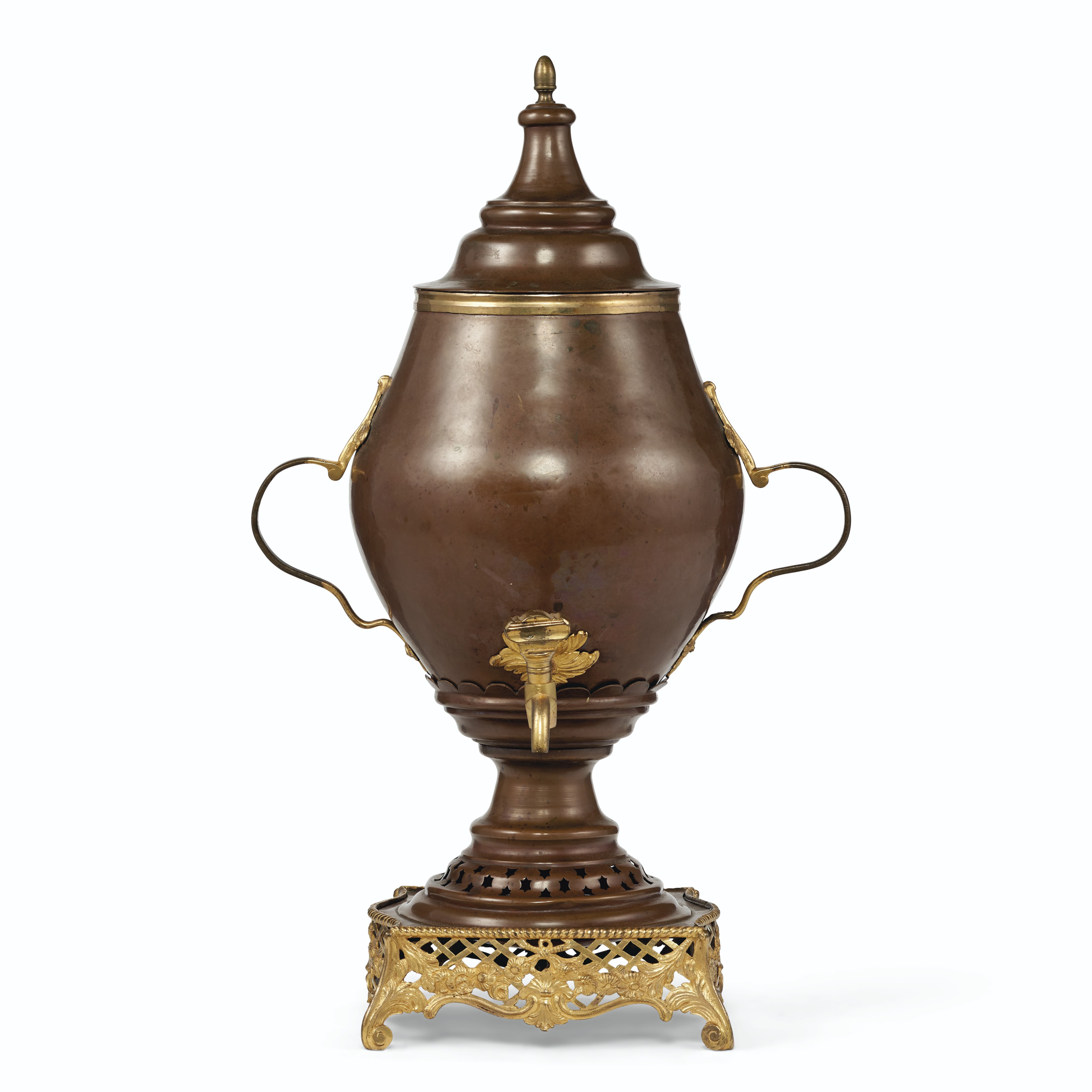 A NORTH EUROPEAN PATINATED TIN, COPPER AND ORMOLU HOT WATER URN ...