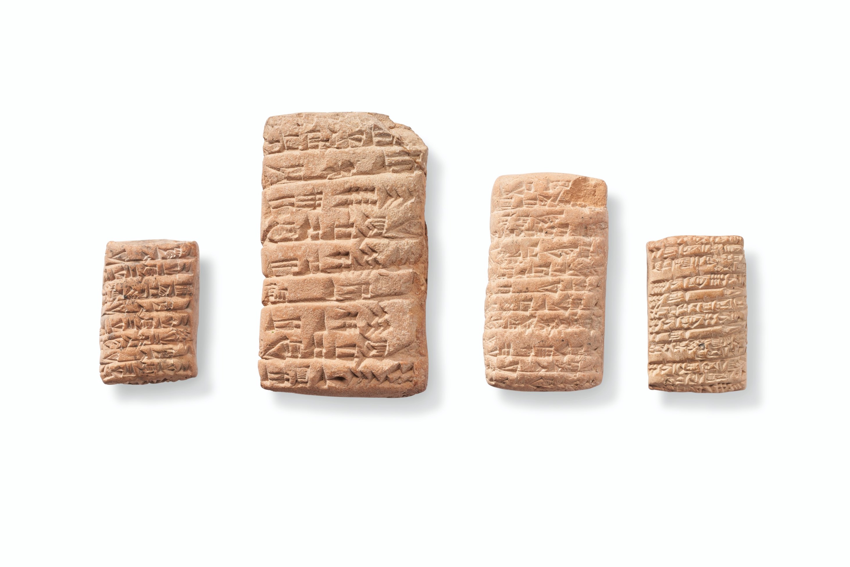 FOUR SUMERIAN CLAY CUNEIFORM TABLETS, ĜIRSU, THIRD DYNASTY OF UR, CIRCA ...