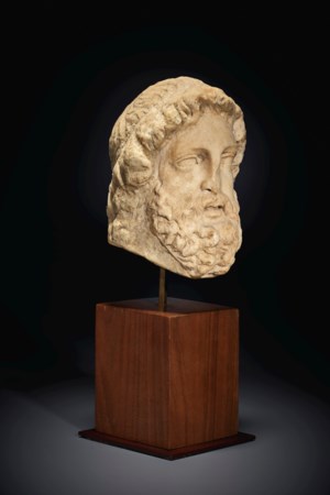 A GREEK MARBLE MALE HEAD, LATE CLASSICAL TO EARLY HELLENISTIC PERIOD ...
