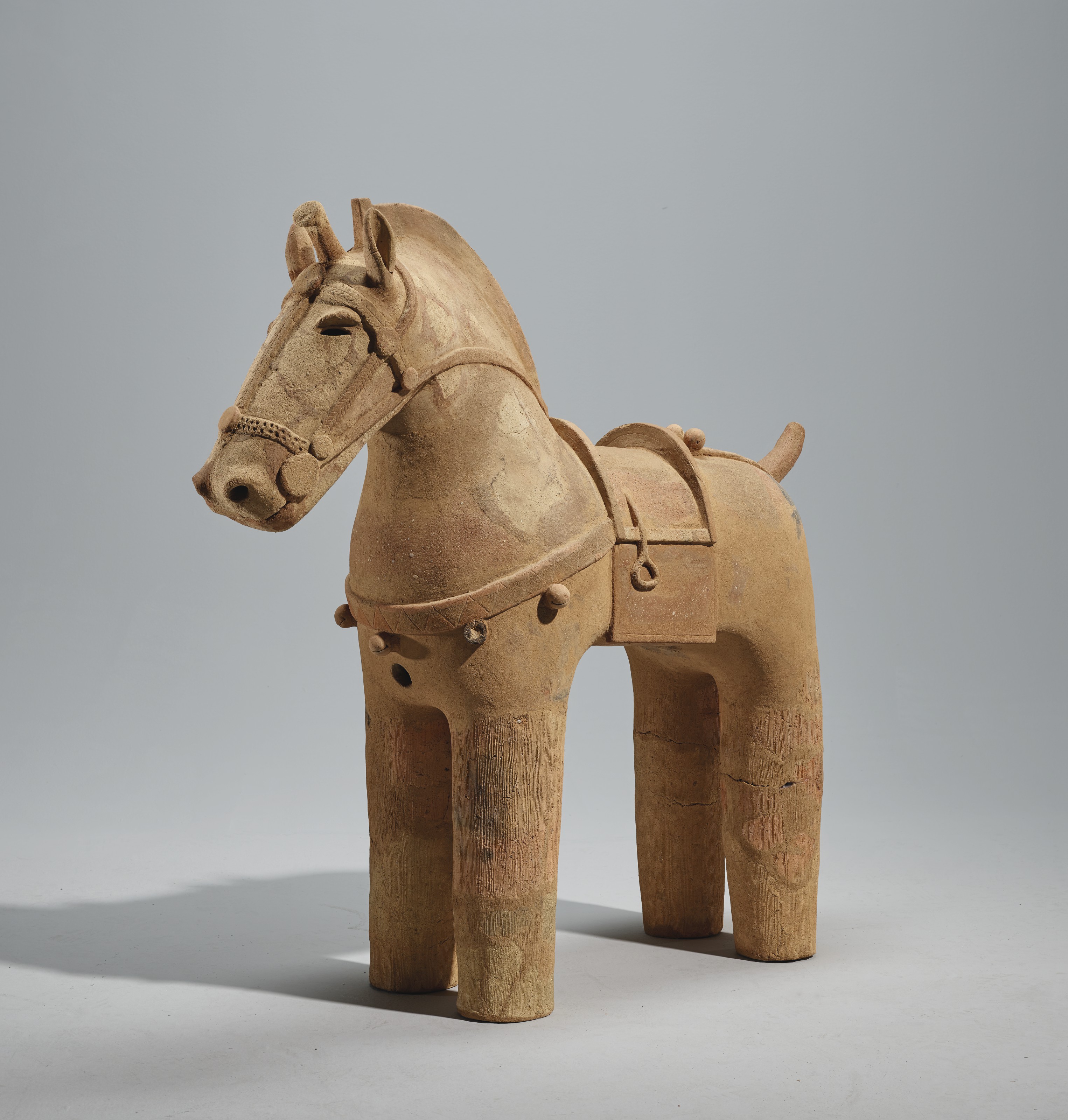 A LARGE HANIWA EARTHENWARE SCULPTURE OF A HORSE