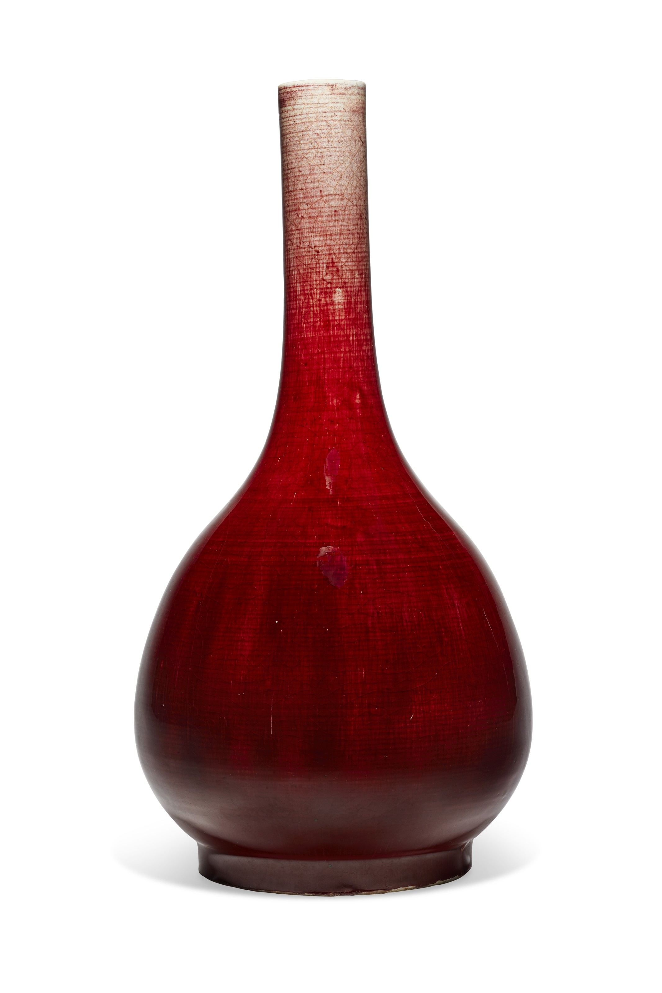 A COPPER-RED-GLAZED BOTTLE VASE, CHINA, 18TH CENTURY | Christie’s