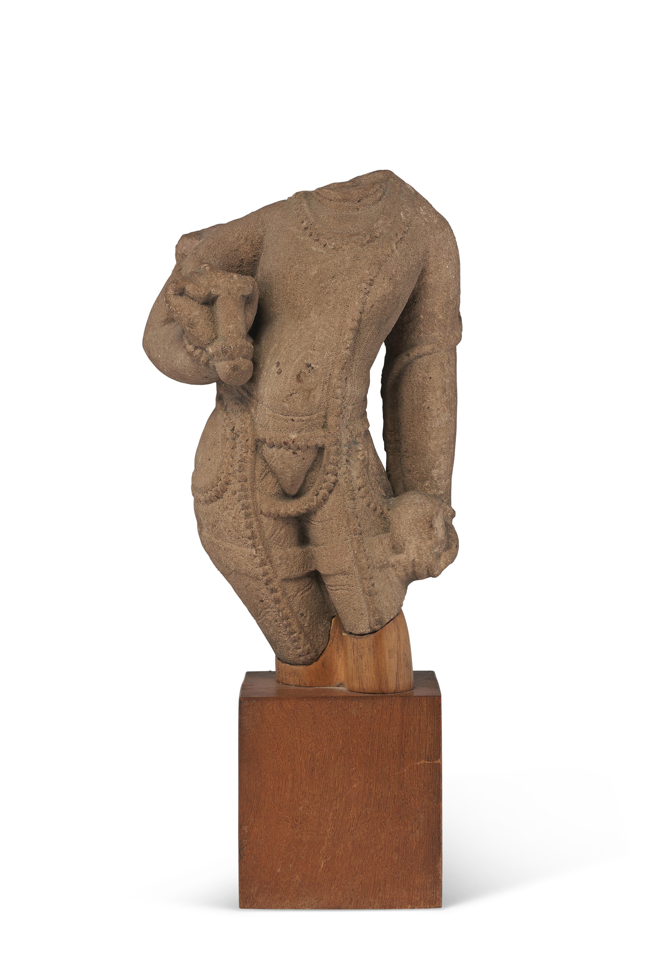 A BUFF SANDSTONE TORSO OF AN ATTENDANT FIGURE, CENTRAL INDIA, MADHYA ...