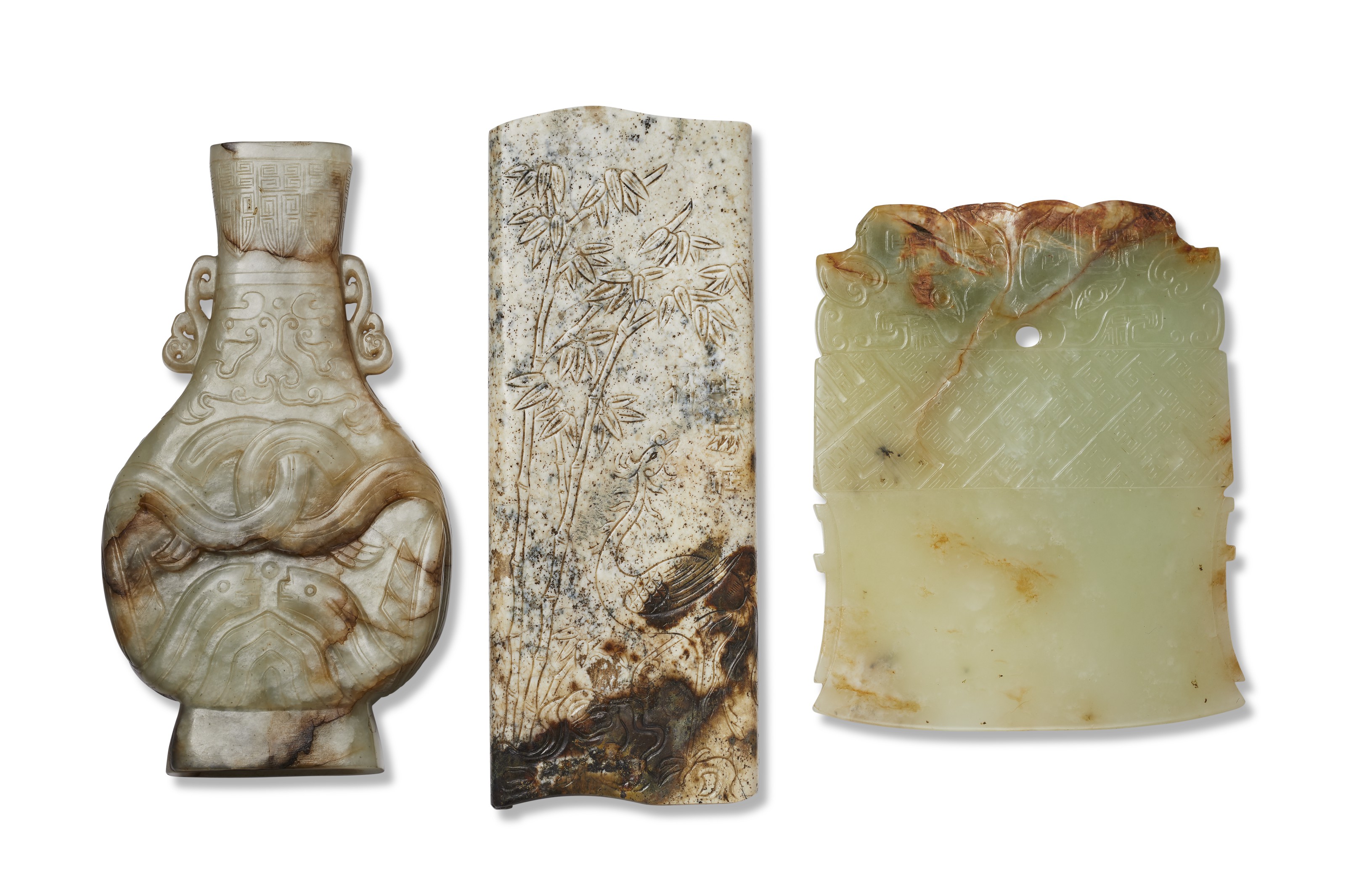 A RUSSET AND GREYISH-GREEN JADE FLATTENED VASE AND A `CHICKEN BONE ...
