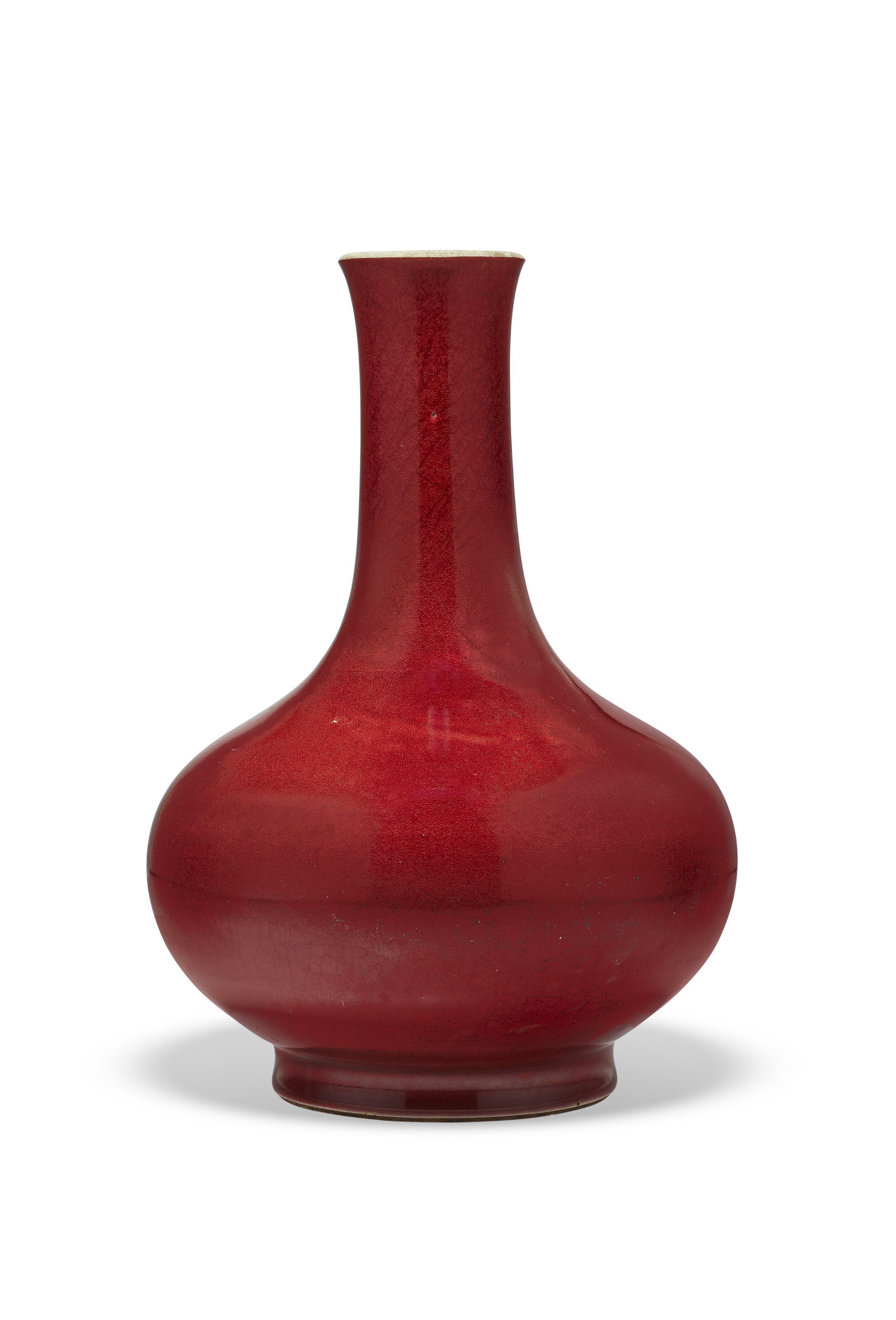 A COPPER-RED-GLAZED BOTTLE VASE, CHINA, 18TH-19TH CENTURY | Christie’s