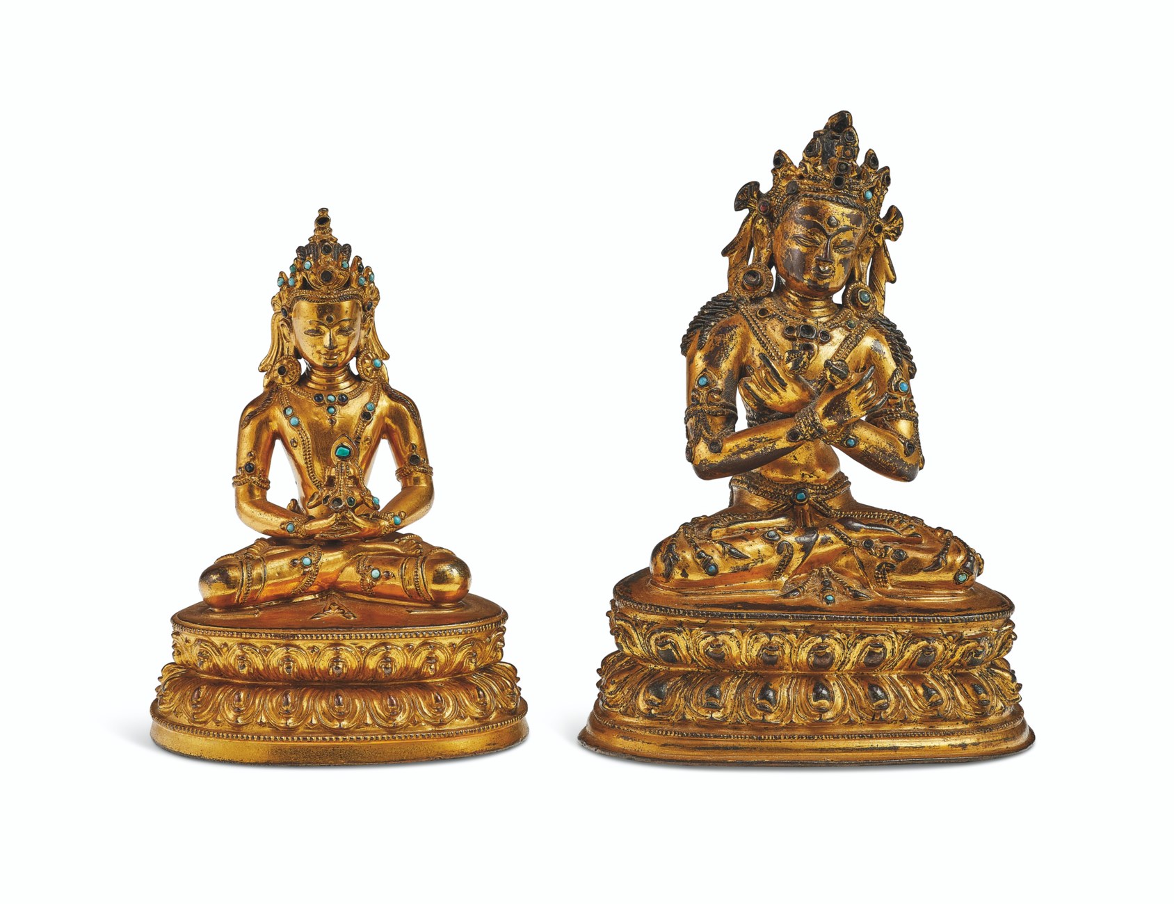 TWO GILT-BRONZE FIGURES OF BUDDHIST DEITIES, TIBET OR NEPAL, 14TH-15TH ...