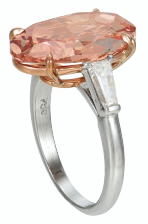 A RARE COLORED DIAMOND AND DIAMOND RING | Christie's