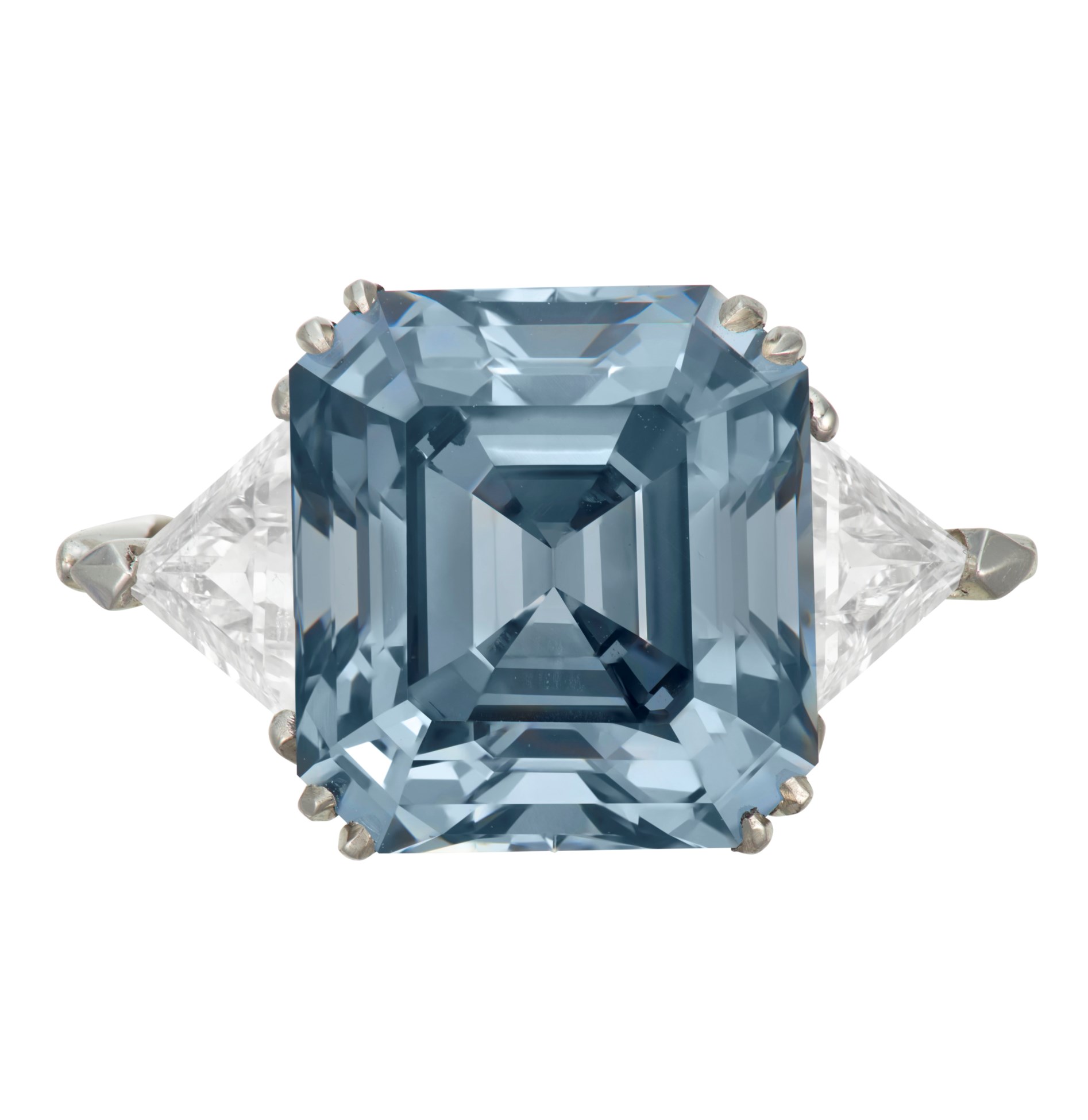 A RARE COLORED DIAMOND AND DIAMOND RING | Christie's