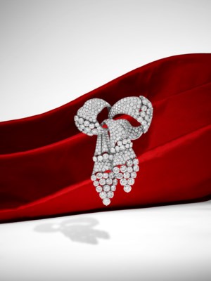 AN ELEGANT BULGARI DIAMOND BOW BROOCH | Christie's