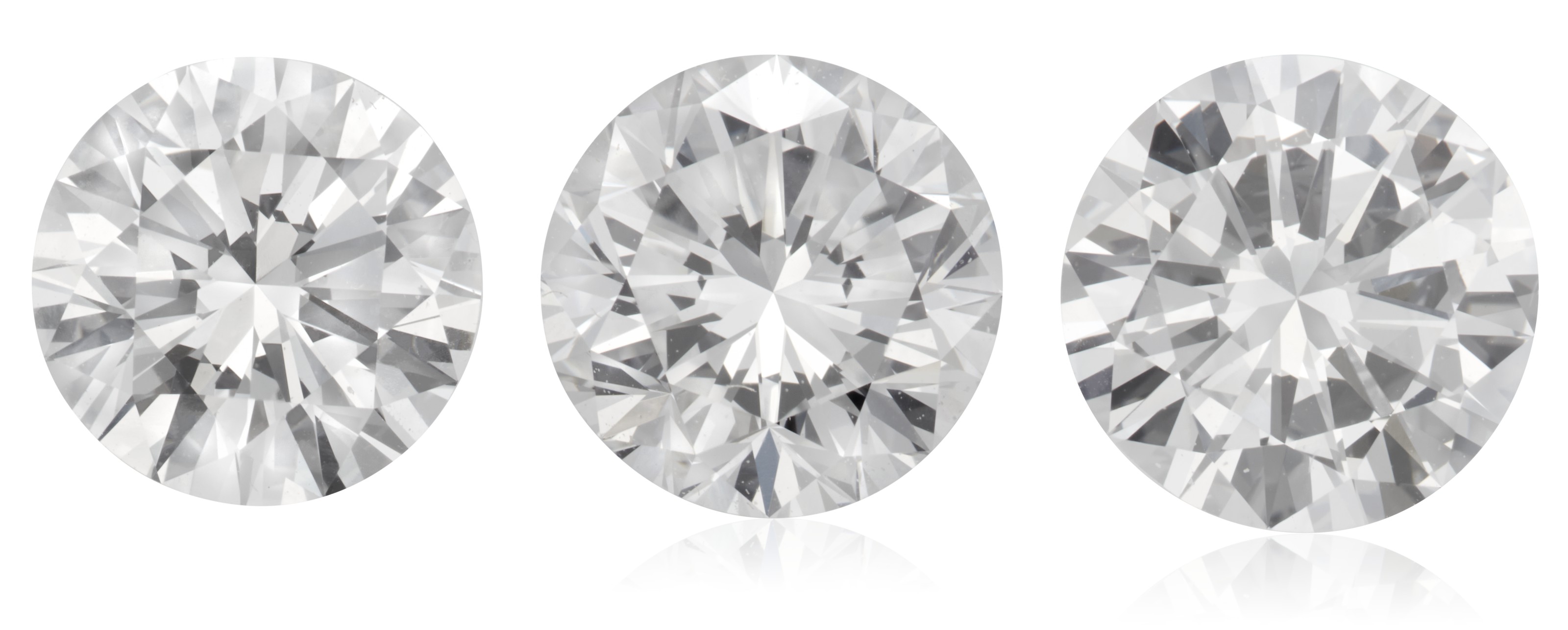GROUP OF THREE UNMOUNTED DIAMONDS, | Christie’s