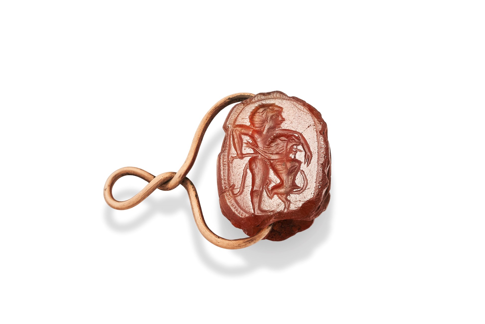A GREEK CARNELIAN SCARAB WITH HERAKLES AND THE NEMEAN LION, ARCHAIC ...
