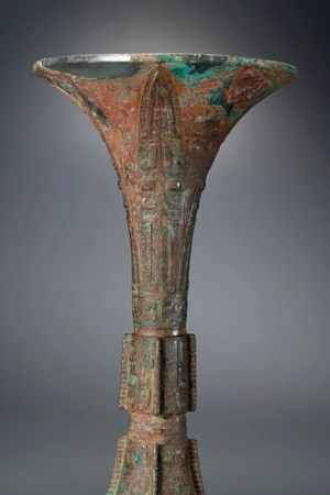 A FINELY CAST BRONZE RITUAL WINE VESSEL, GU, LATE SHANG DYNASTY, ANYANG ...