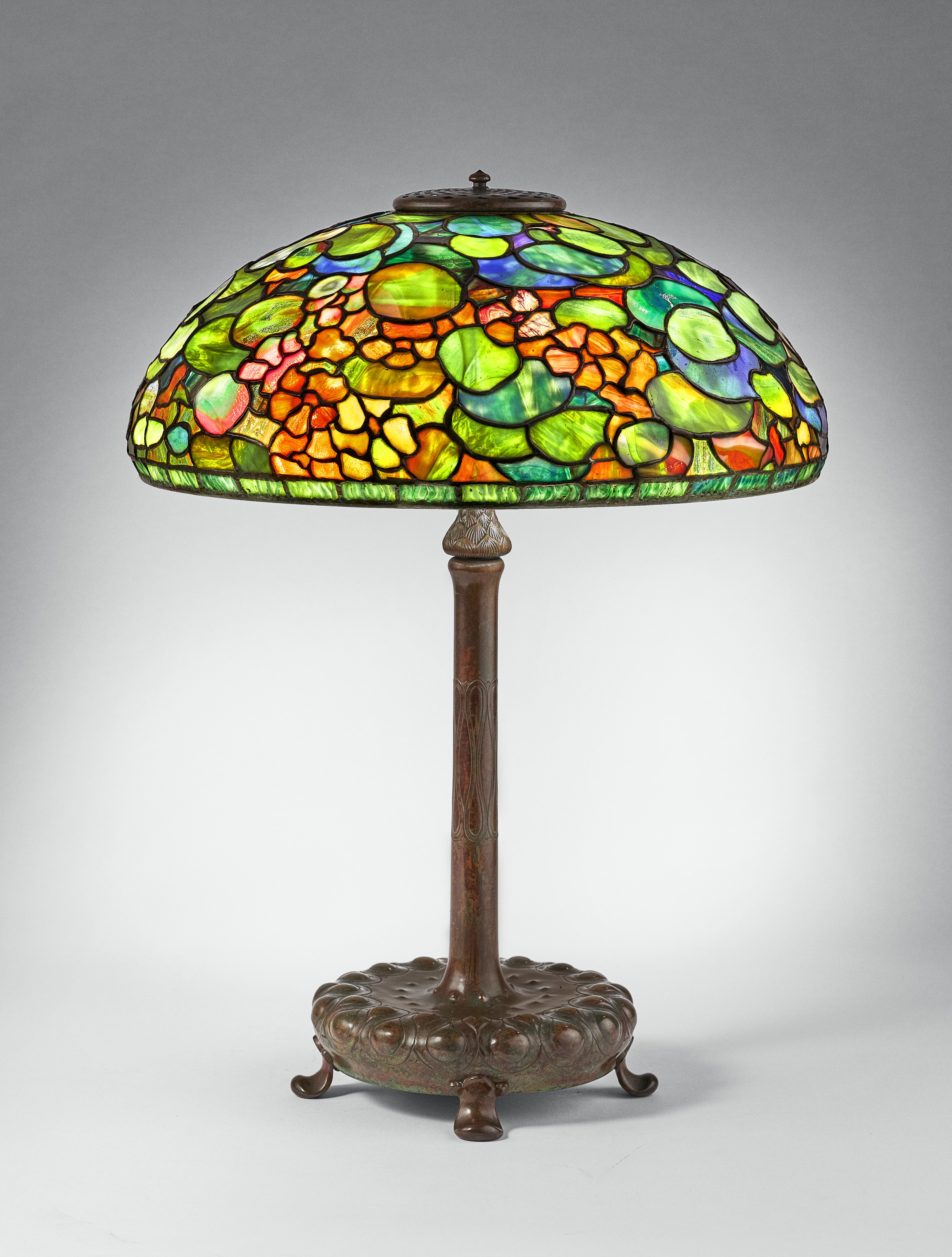 TIFFANY STUDIOS, Rare 'American Indian' Table Lamp, circa 1910 | Christie's