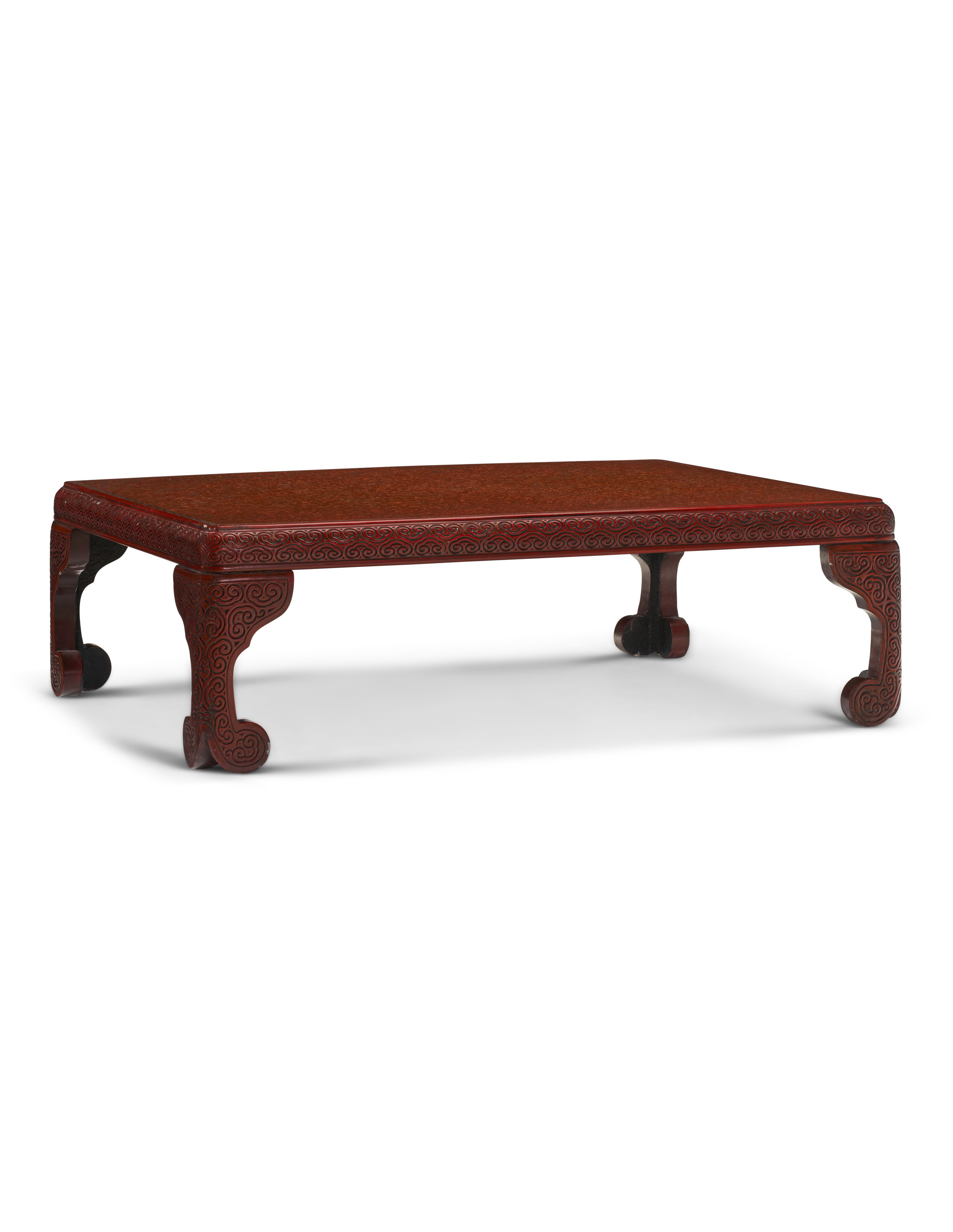 A CHINESE RED LACQUER LOW TABLE, 20TH CENTURY | Christie’s