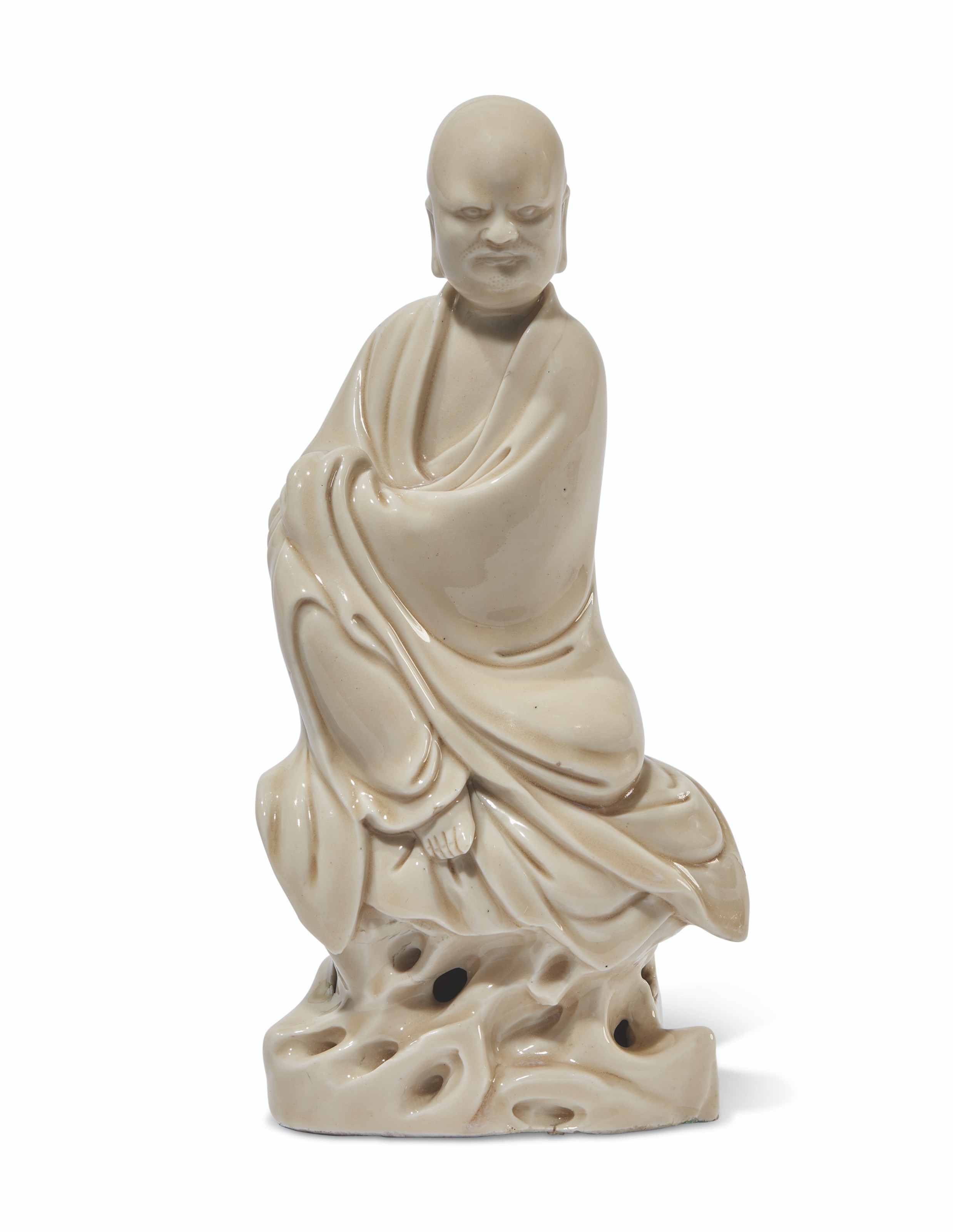 A DEHUA FIGURE OF DAMO, CHINA, 17TH CENTURY | Christie’s