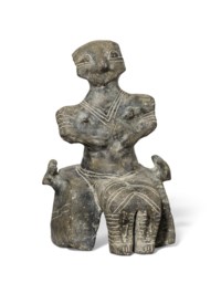 A VINCA TERRACOTTA SEATED FEMALE FIGURE, NEOLITHIC PERIOD, CIRCA 5TH ...