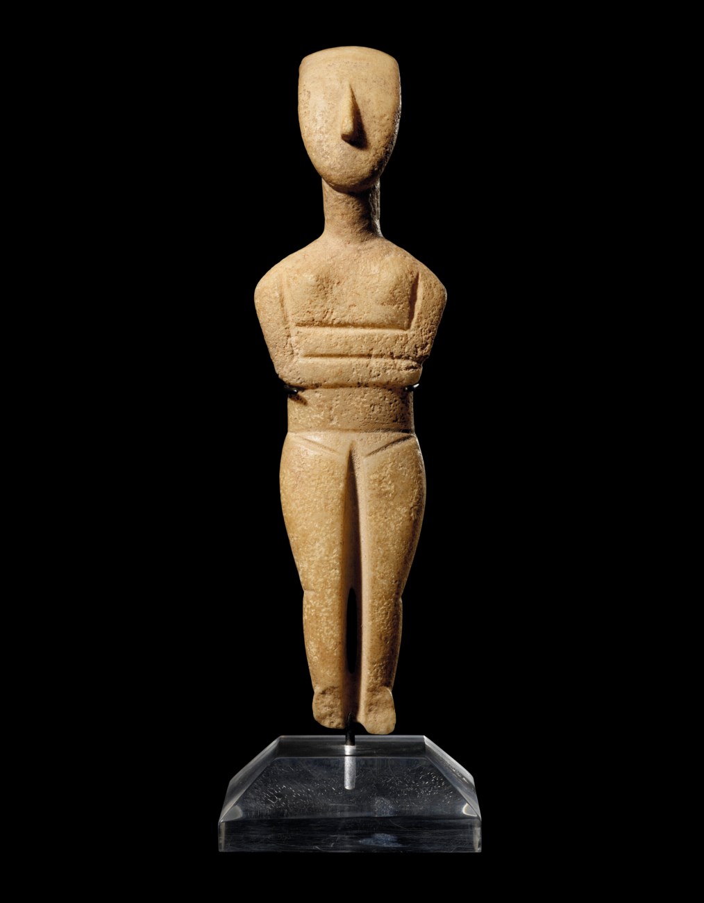 A CYCLADIC MARBLE RECLINING FEMALE FIGURE, EARLY SPEDOS VARIETY, CIRCA ...