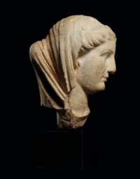 A ROMAN MARBLE VEILED FEMALE HEAD, CIRCA 1ST CENTURY B.C./A.D. | Christie's