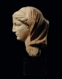 A ROMAN MARBLE VEILED FEMALE HEAD, CIRCA 1ST CENTURY B.C./A.D. | Christie's