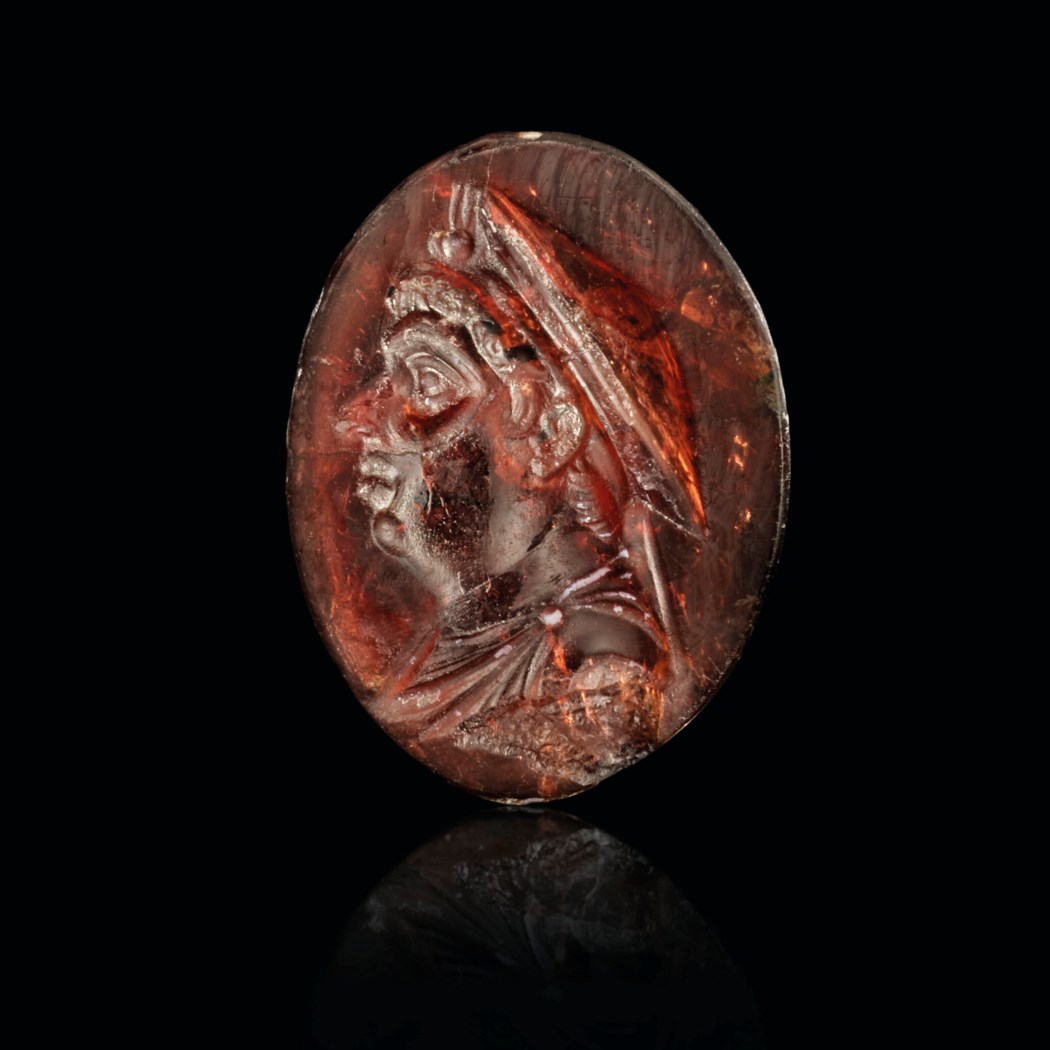 A GREEK GARNET RINGSTONE WITH PROFILE HEAD OF A PTOLEMAIC KING ...