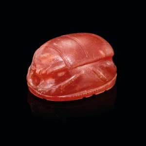 AN ETRUSCAN CARNELIAN SCARAB WITH TWO ATHLETES