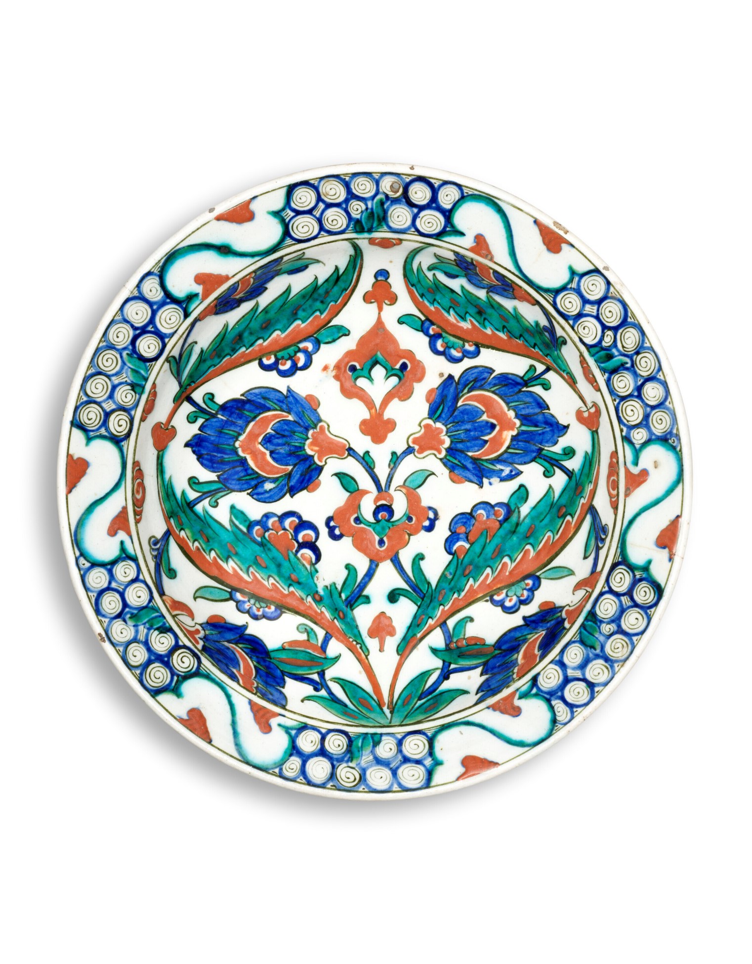 AN IZNIK POTTERY DISH, OTTOMAN TURKEY, CIRCA 1570 | Christie's