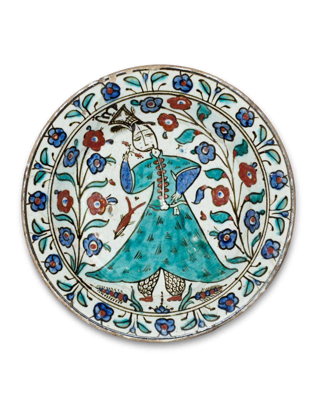 A FIGURAL IZNIK POTTERY DISH, OTTOMAN TURKEY, FIRST HALF 17TH CENTURY | Christie's