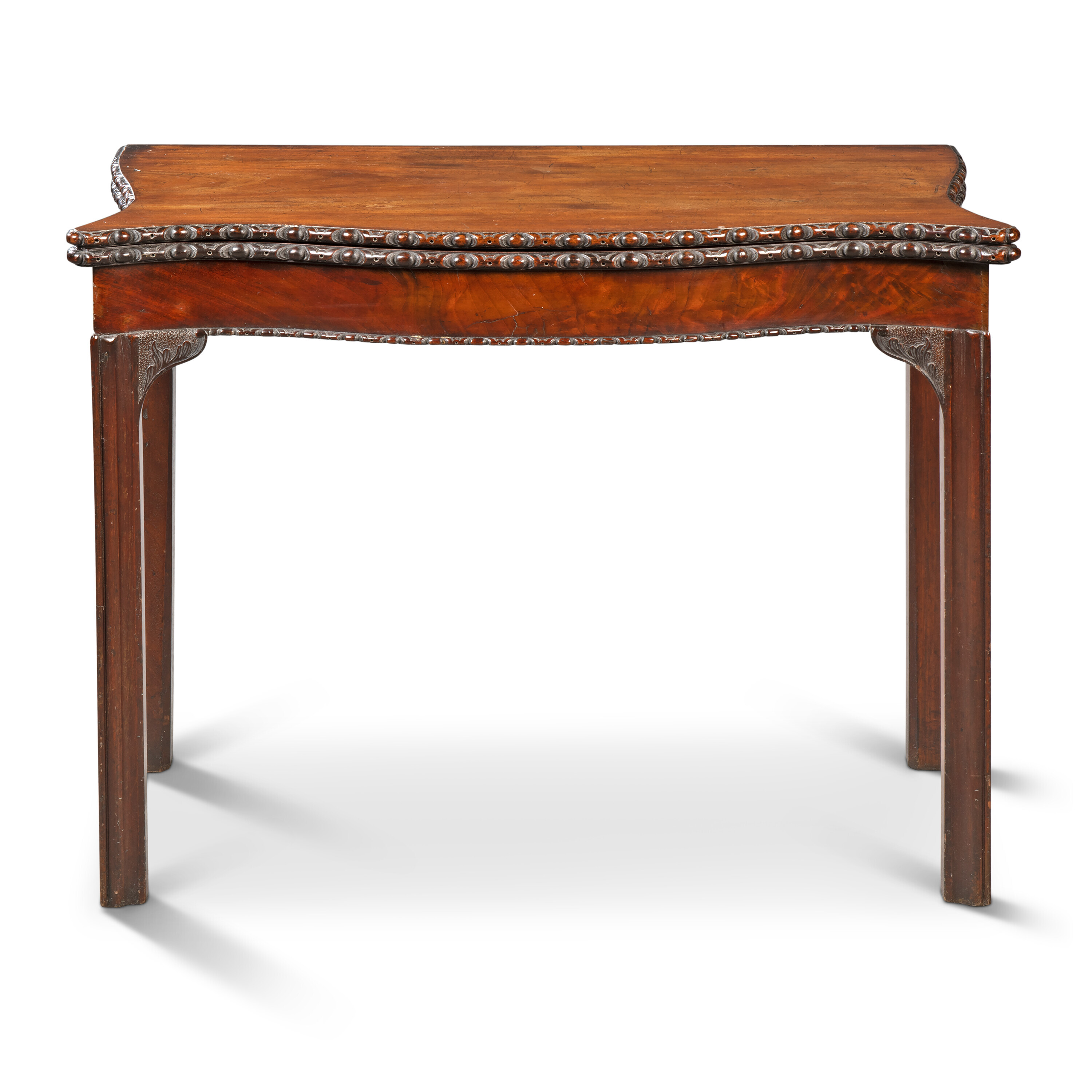 A GEORGE III MAHOGANY SERPENTINE TEA-TABLE, CIRCA 1775 | Christie’s