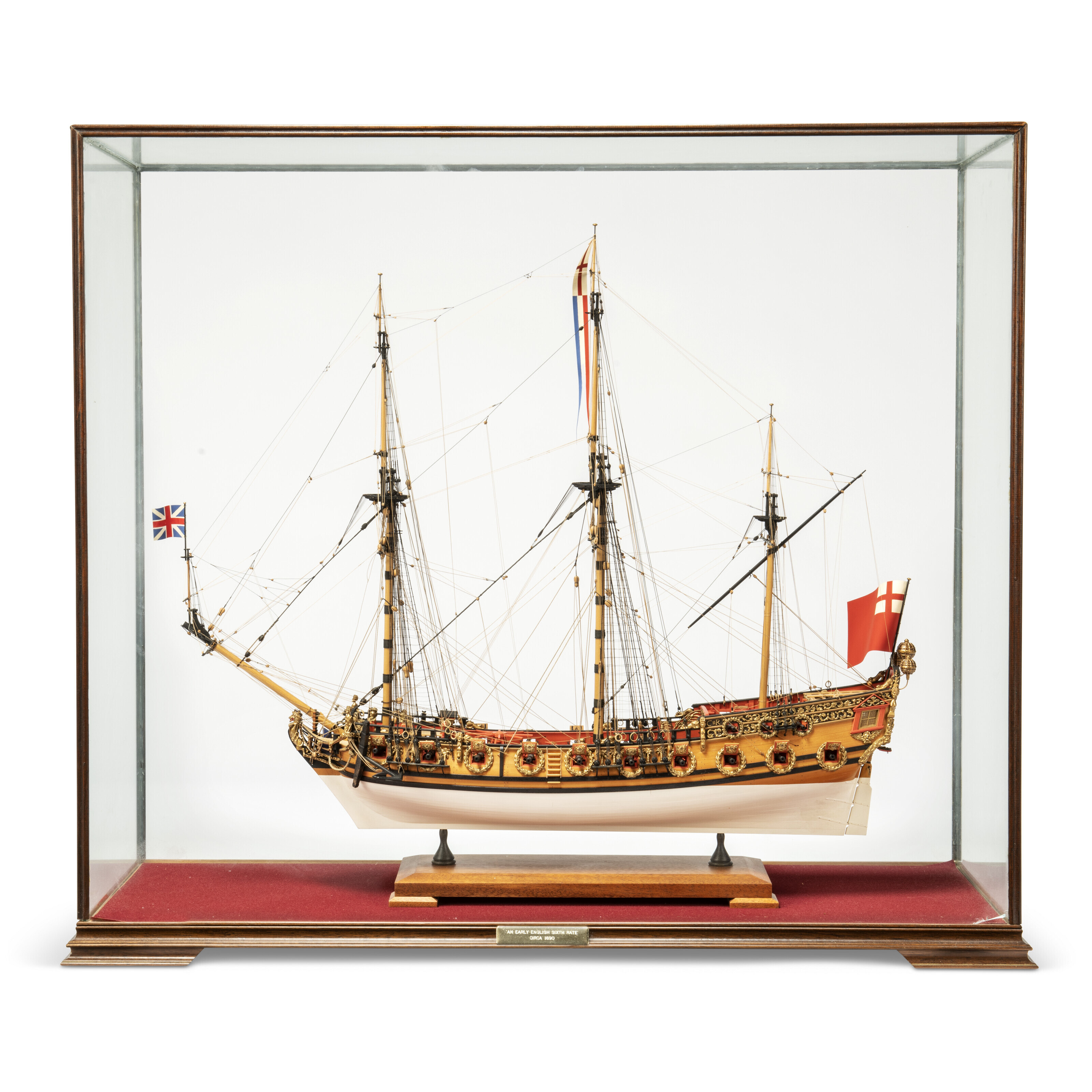 A FULLY RIGGED AND PLANKED STAINED WOOD MODEL OF A CHARLES II 26-GUN ...