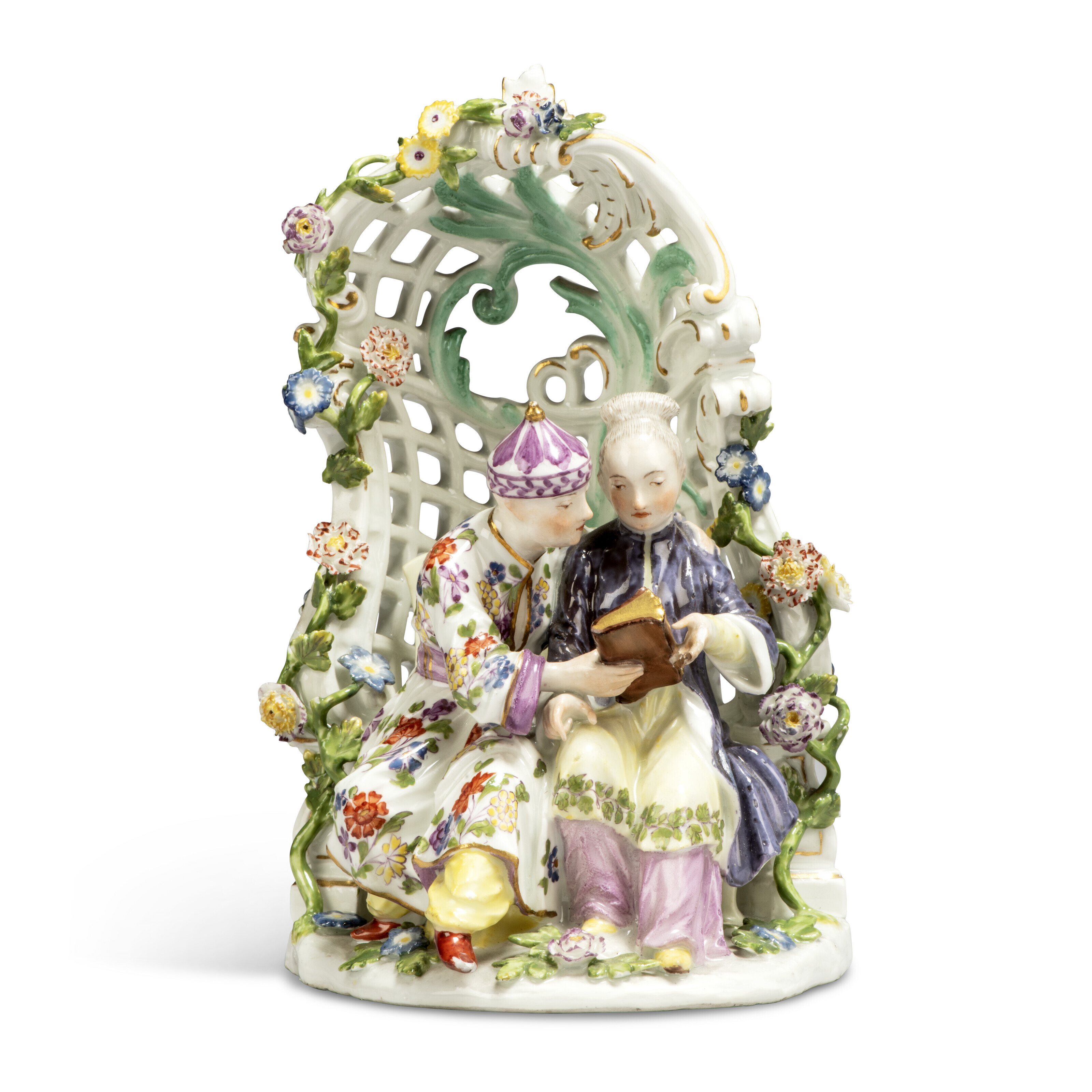 A MEISSEN PORCELAIN GROUP OF A CHINOISERIE COUPLE SEATED IN AN ARBOUR ...