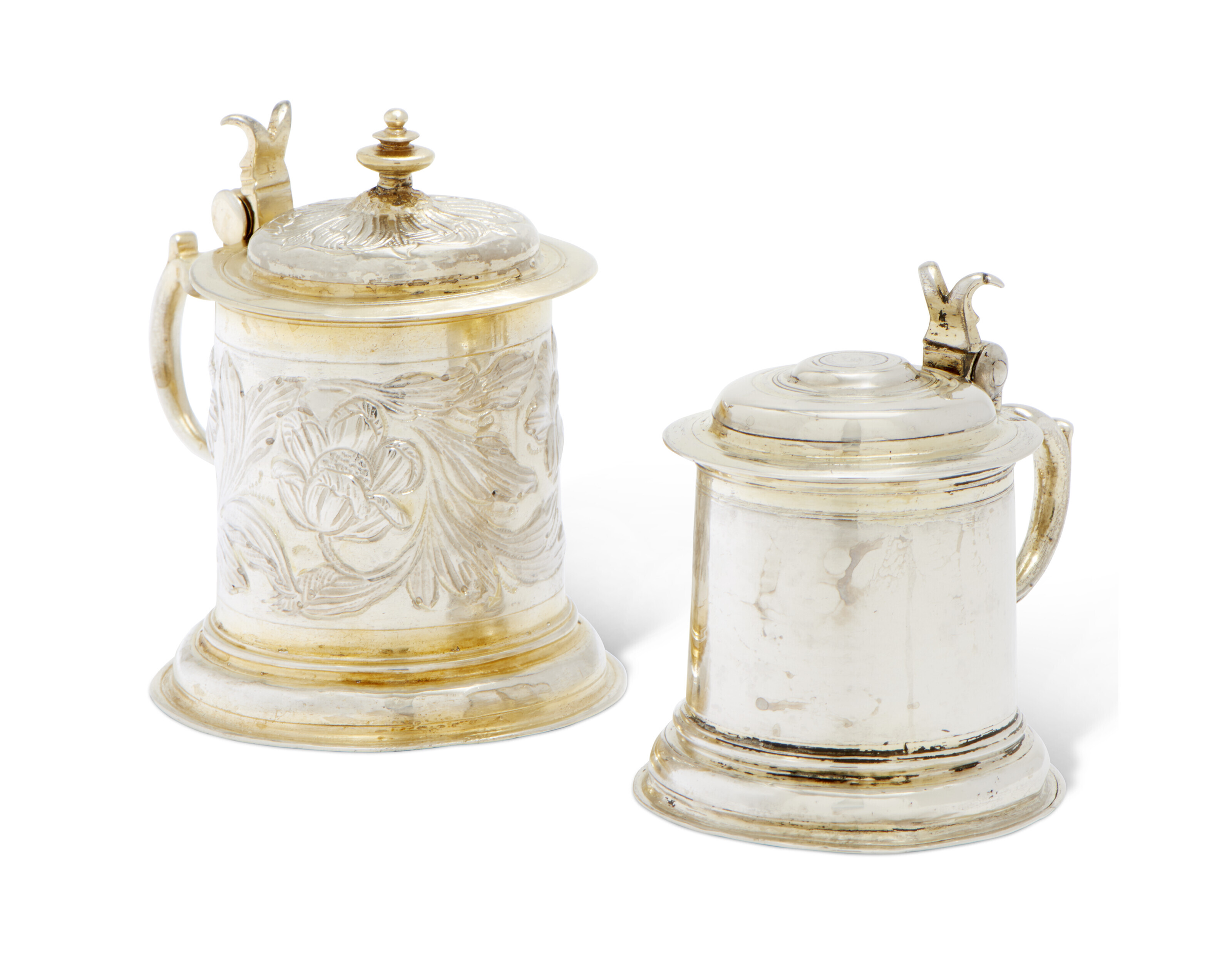 TWO GERMAN PARCEL-GILT SILVER MINIATURE TANKARDS, THE SMALLER CIRCA ...