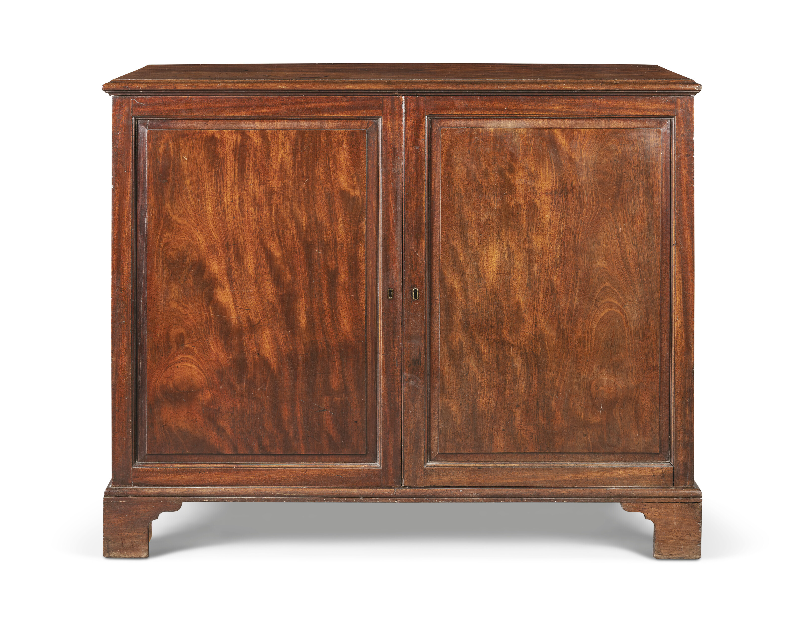 A GEORGE II MAHOGANY CLOTHES-PRESS, CIRCA 1760, POSSIBLY BY THOMAS ...