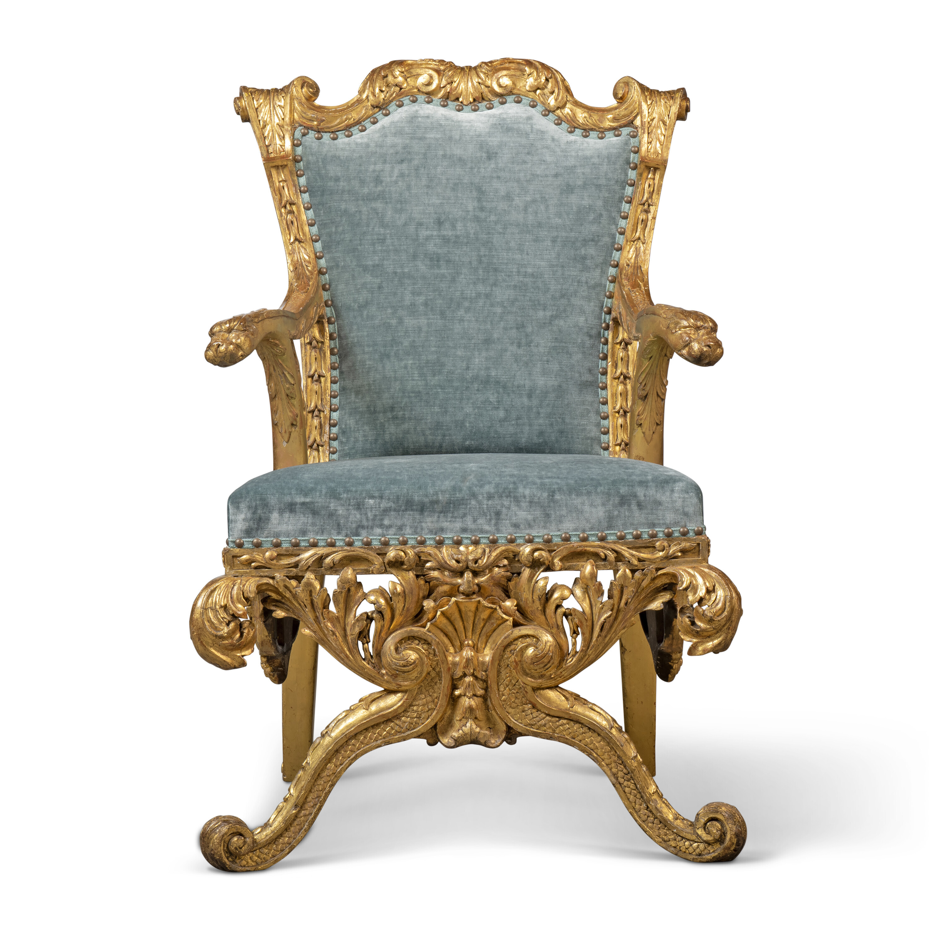 A GEORGE II GILT WALNUT ARMCHAIR, IN THE MANNER OF WILLIAM KENT, CIRCA ...
