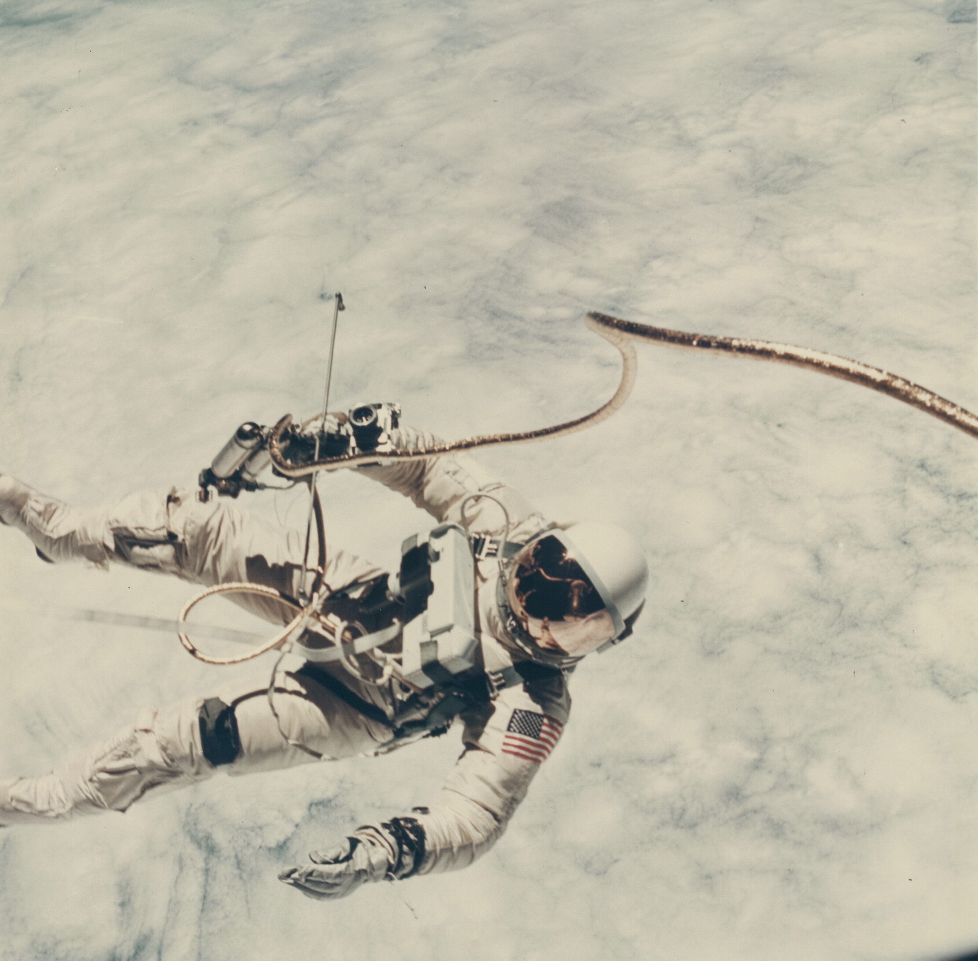 FIRST U.S. SPACEWALK; ED WHITE’S EVA OVER THE CLOUD-COVERED PACIFIC ...
