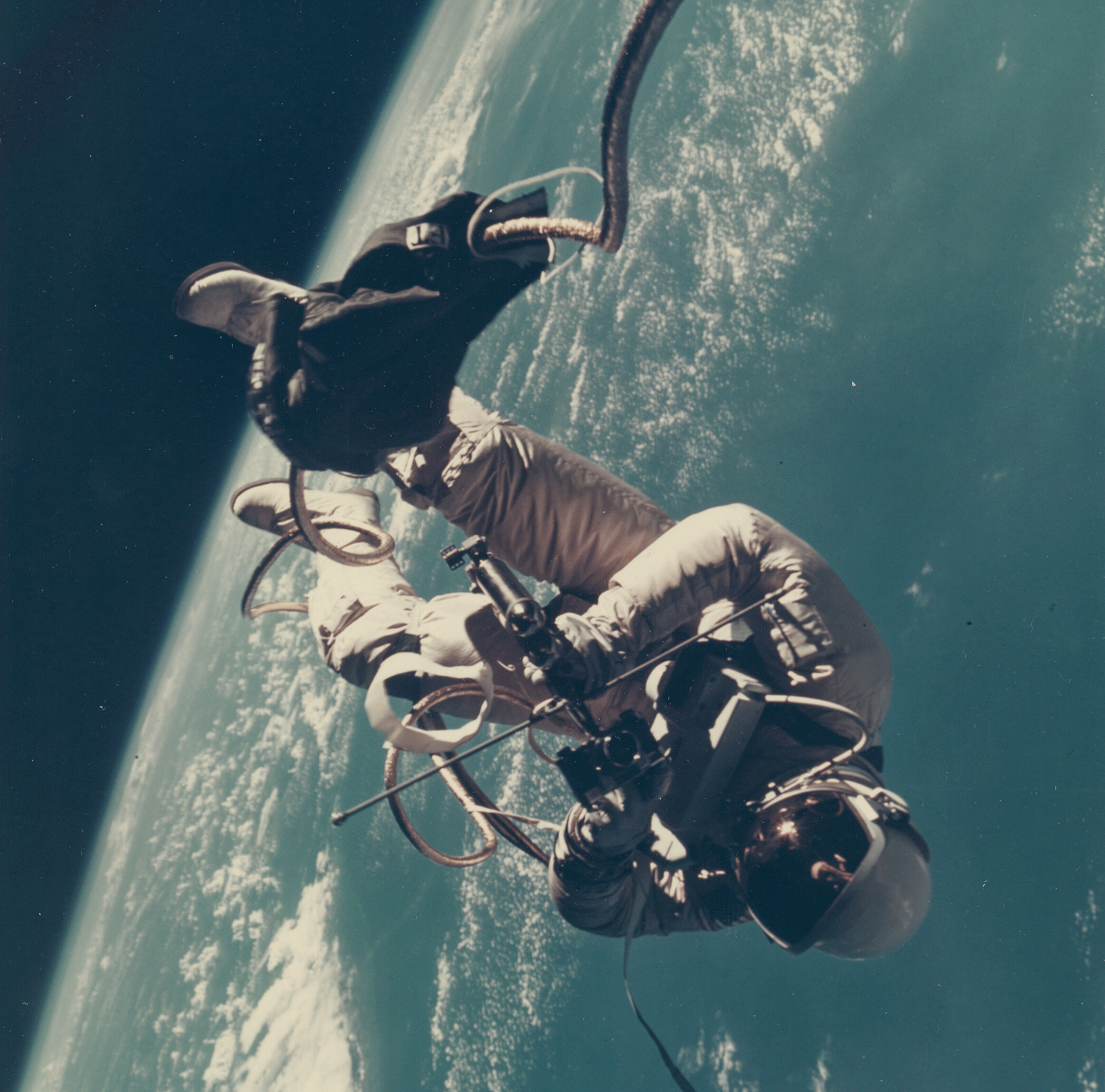 FIRST U.S. SPACEWALK, ED WHITE PHOTOGRAPHING THE SPACECRAFT DURING HIS ...
