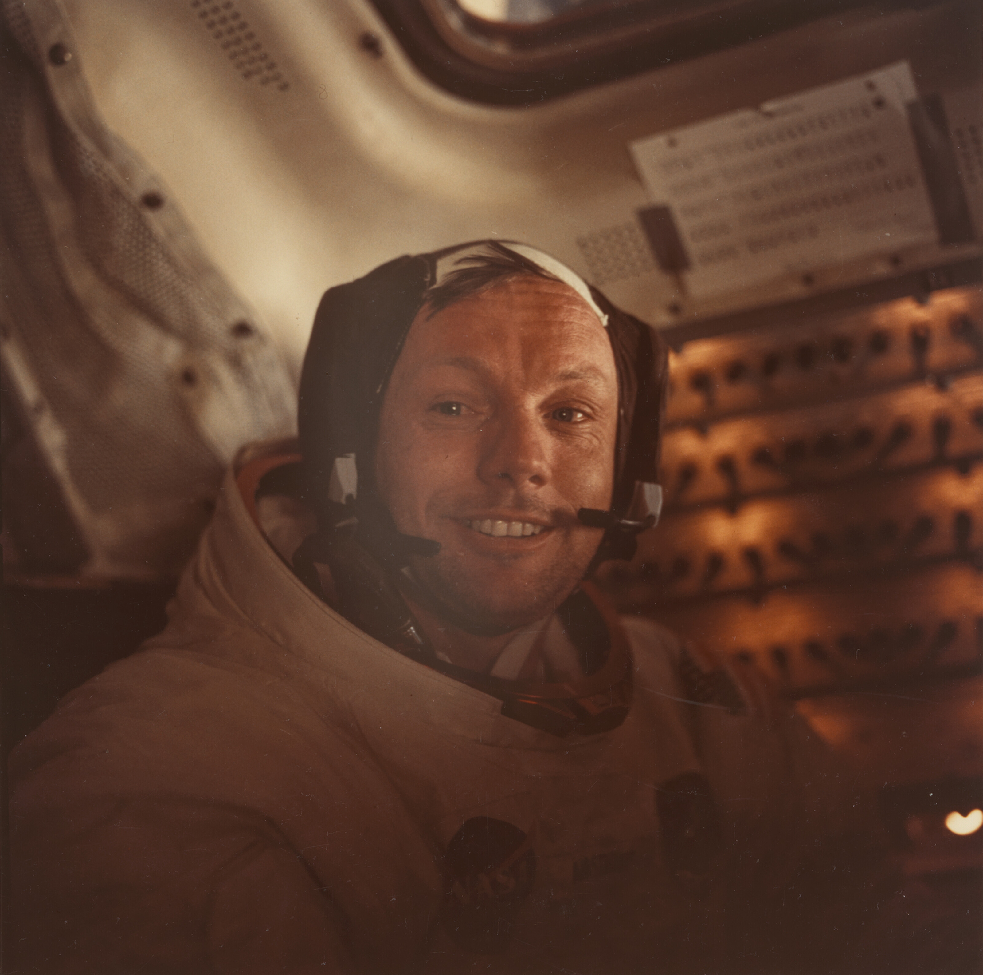 PORTRAIT OF NEIL ARMSTRONG BACK IN THE LUNAR MODULE AFTER THE HISTORIC ...